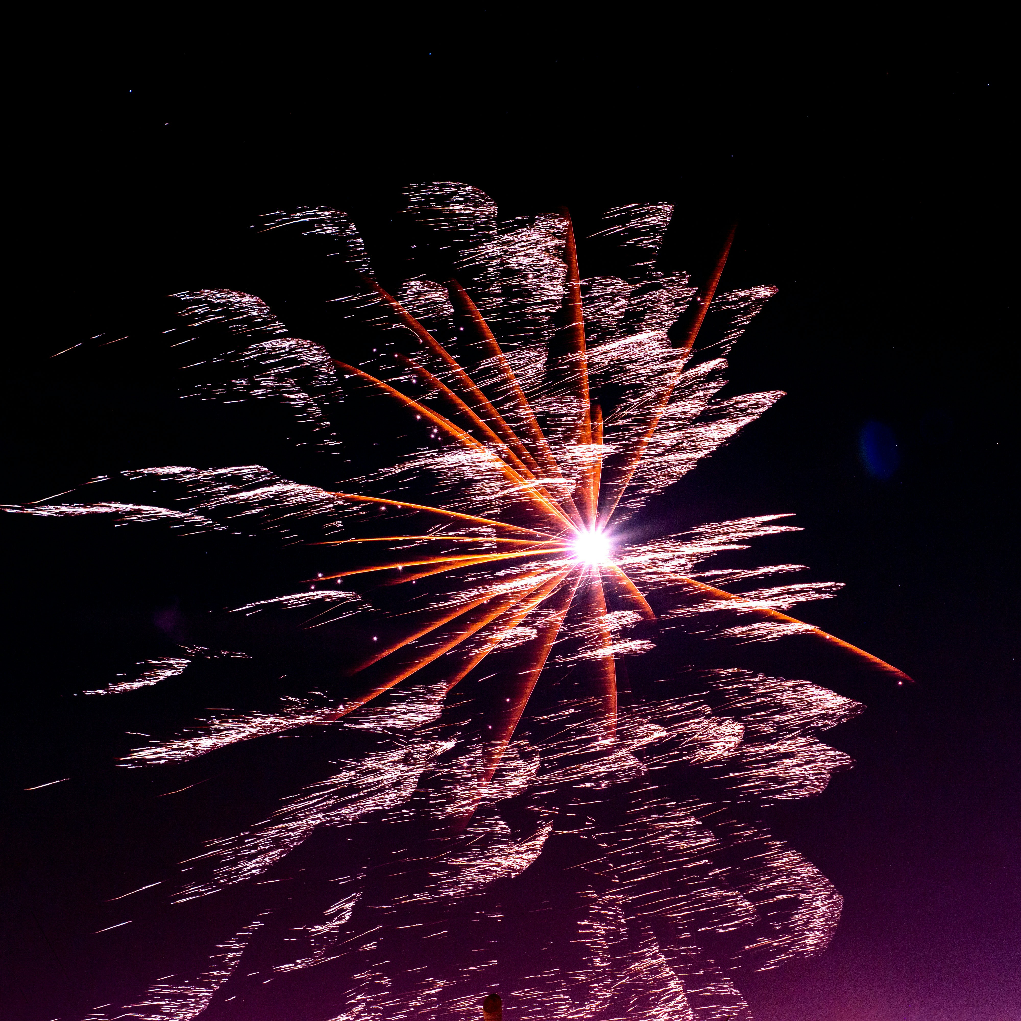 A large fireworks is lit up in the night sky photo – Free Fireworks ...