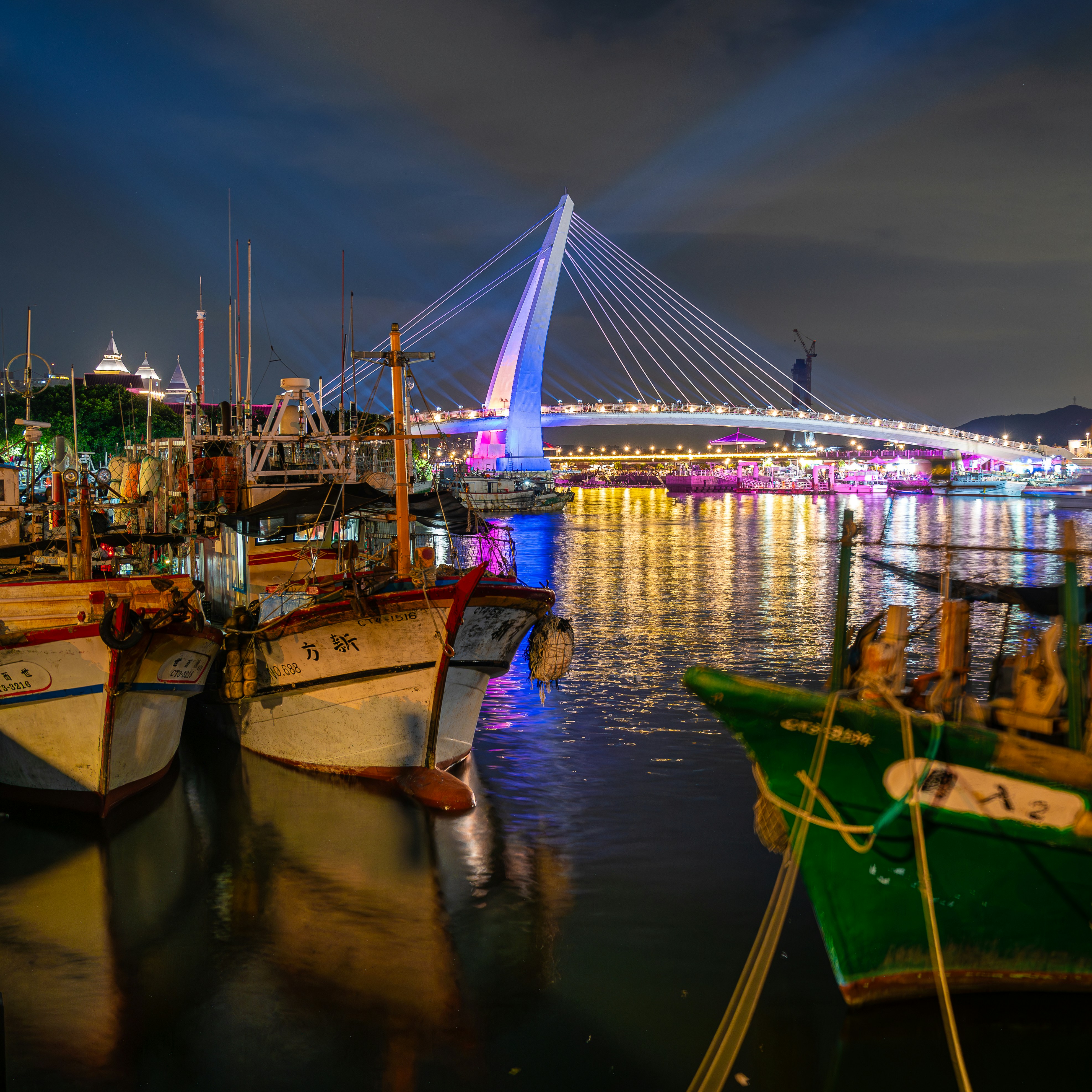 Neon Arches Over a Moonlit Harbor