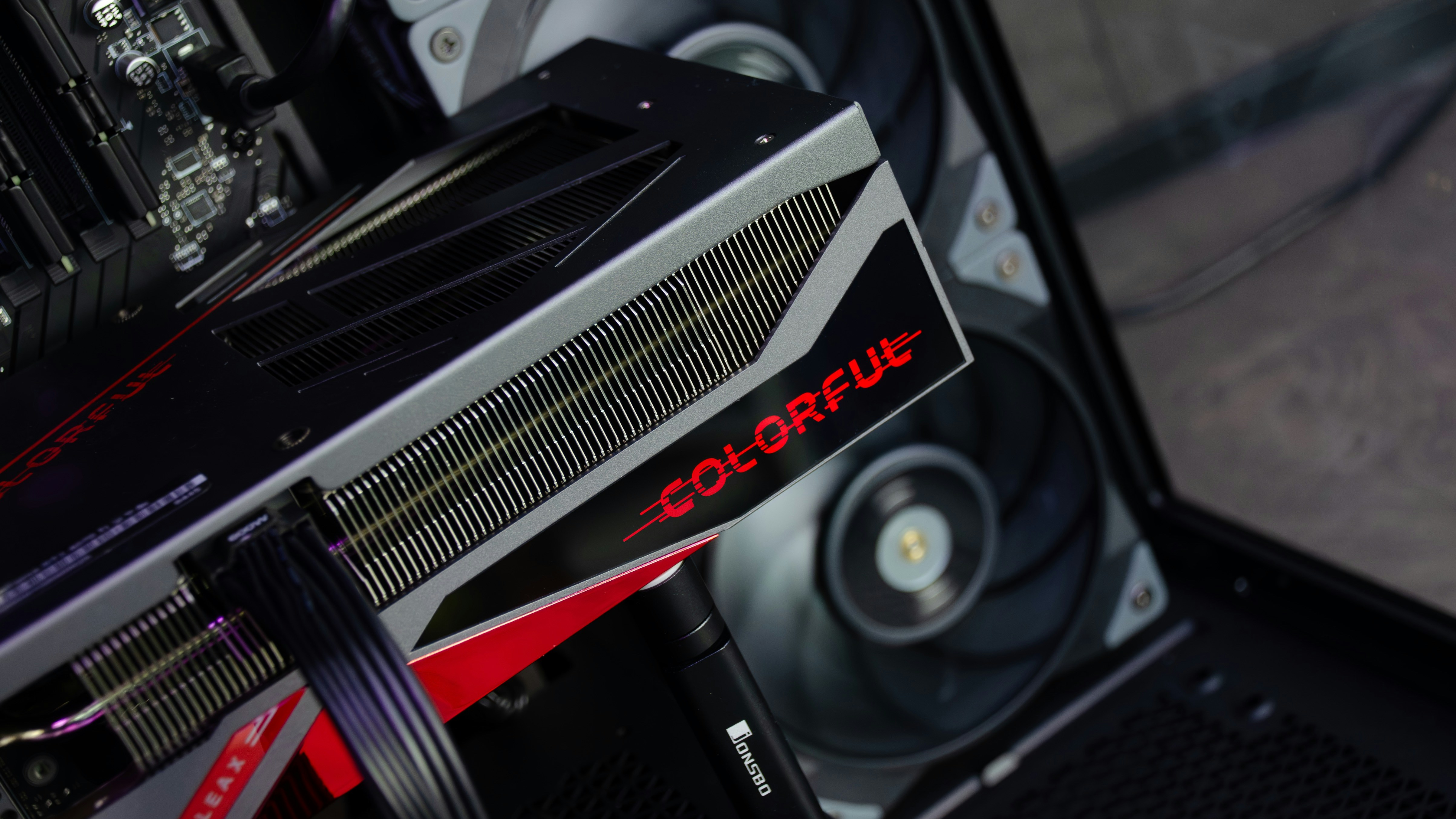 A close up of a computer with a red and black logo on it photo – Free ...