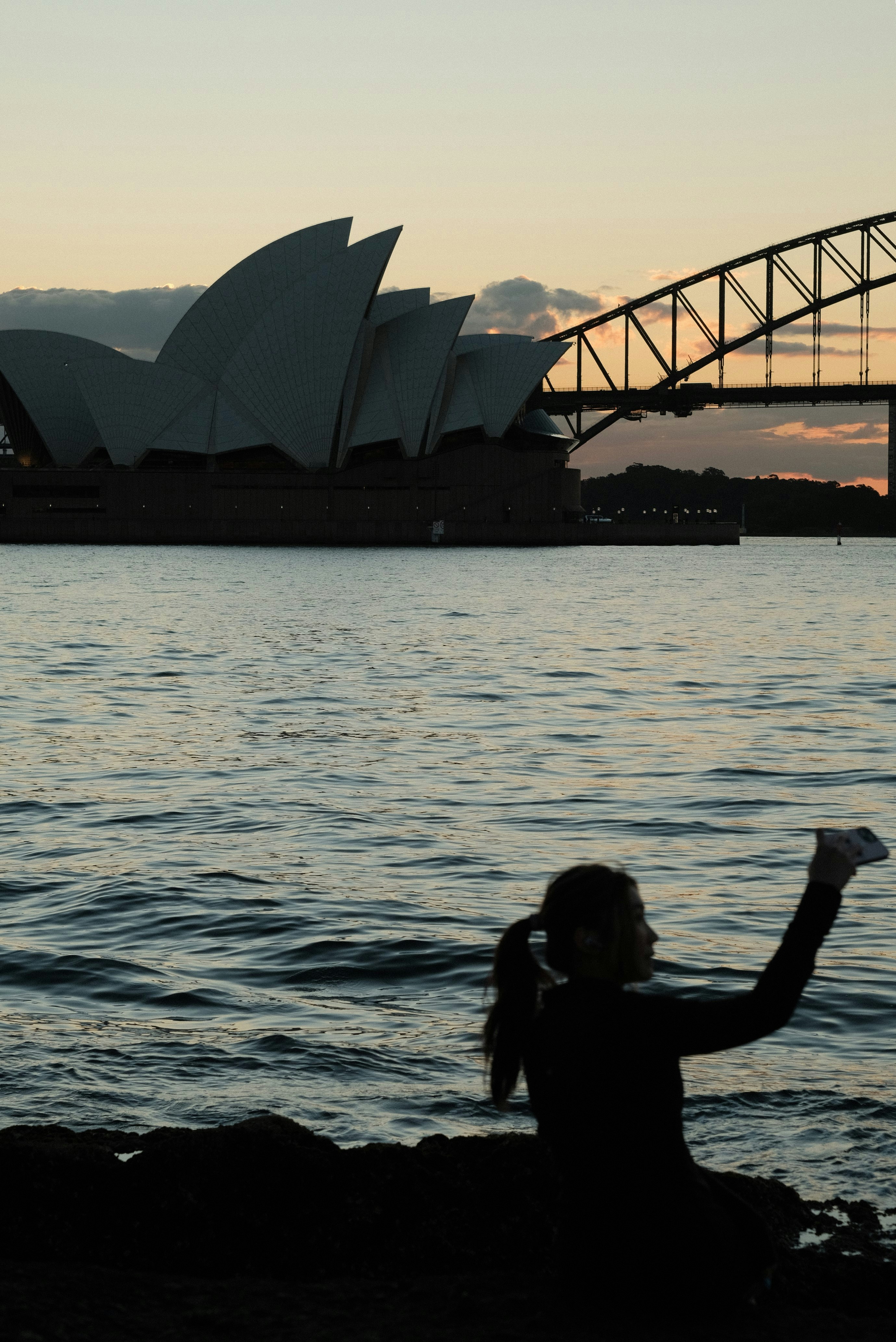Sunset Selfie: Silhouette by Sydney's Opera House and Harbour Bridge