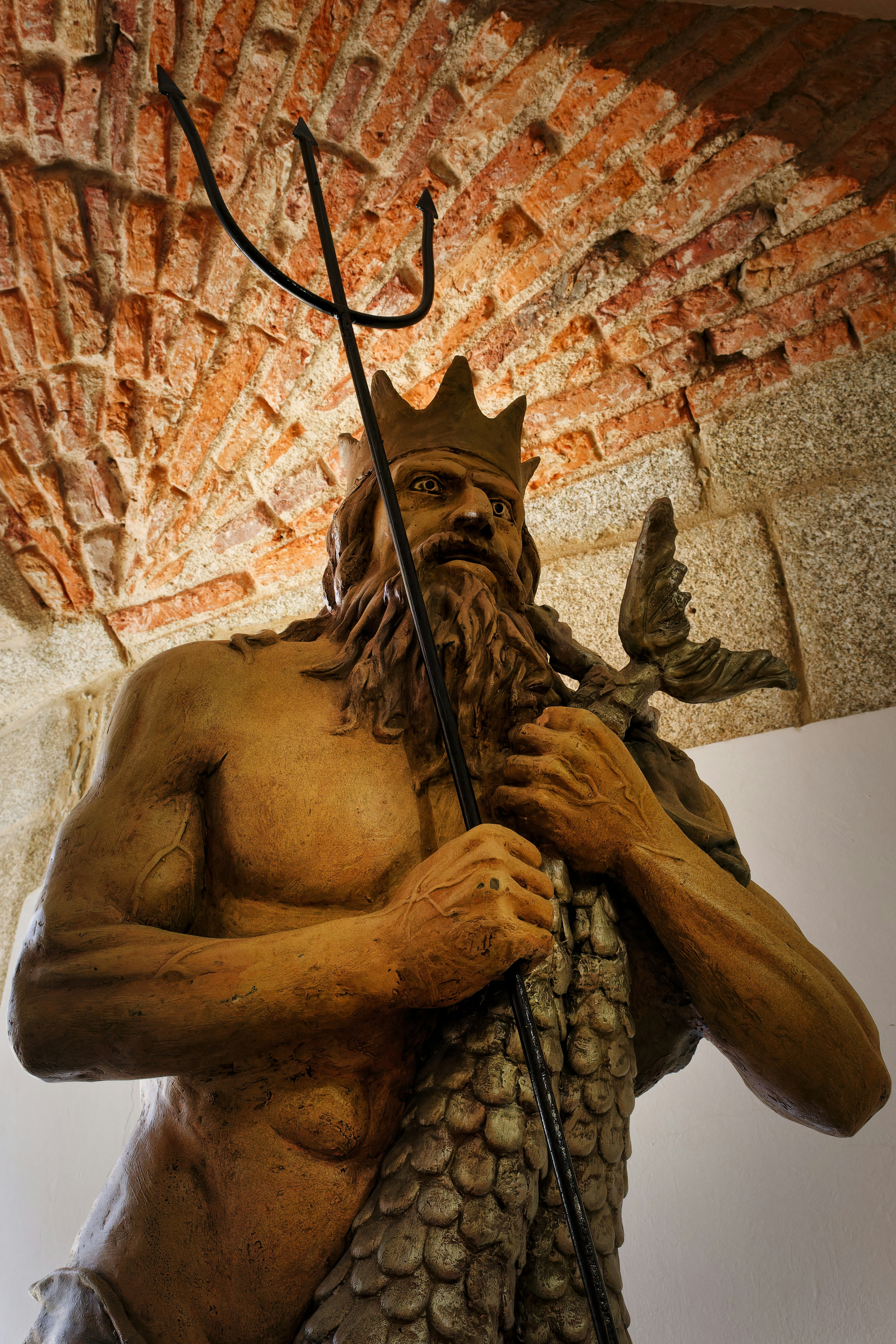 A Titan King with Trident Under Brick Vault