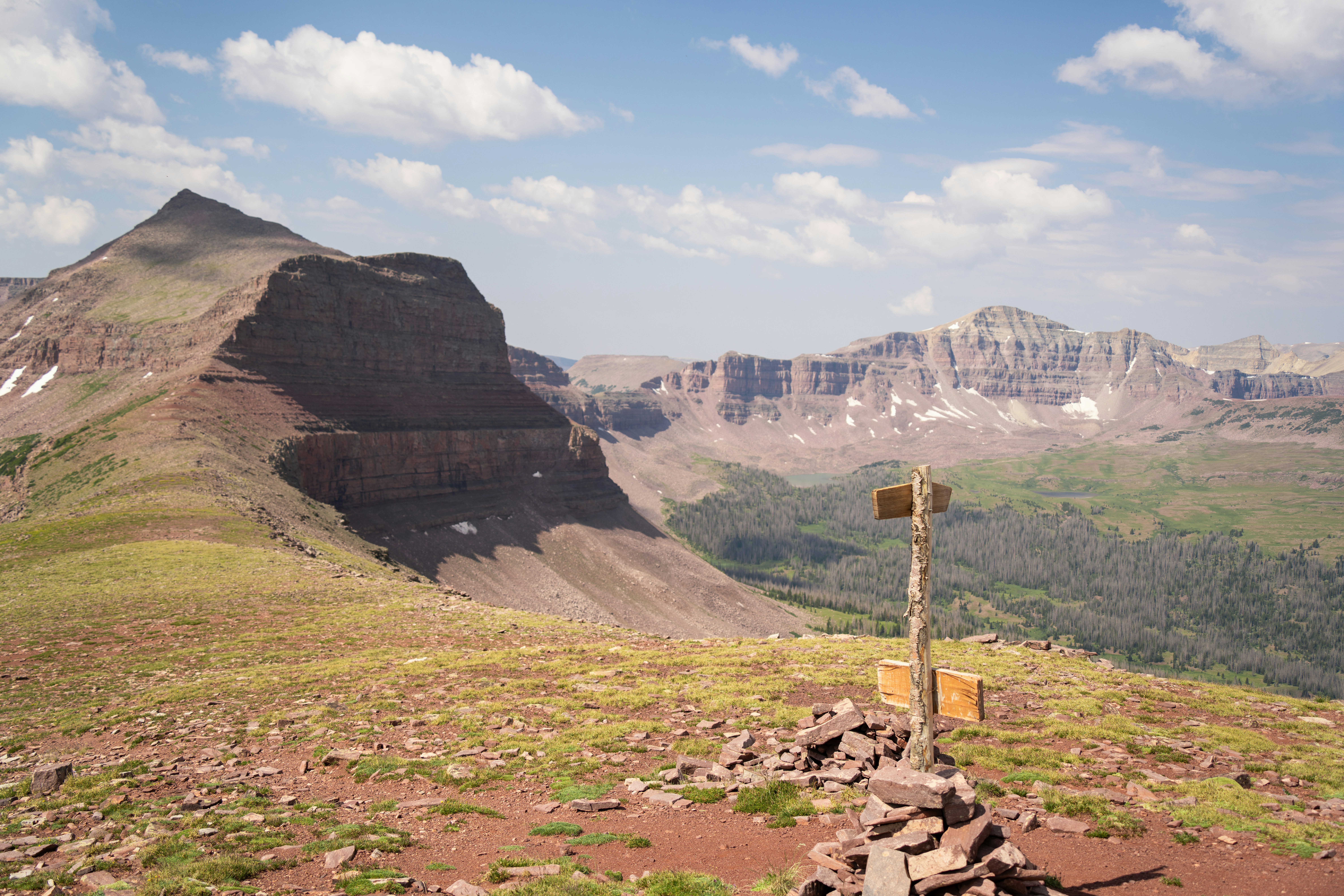 Trail Marker on the Mesa: A Canyon Ridge Under Open Sky