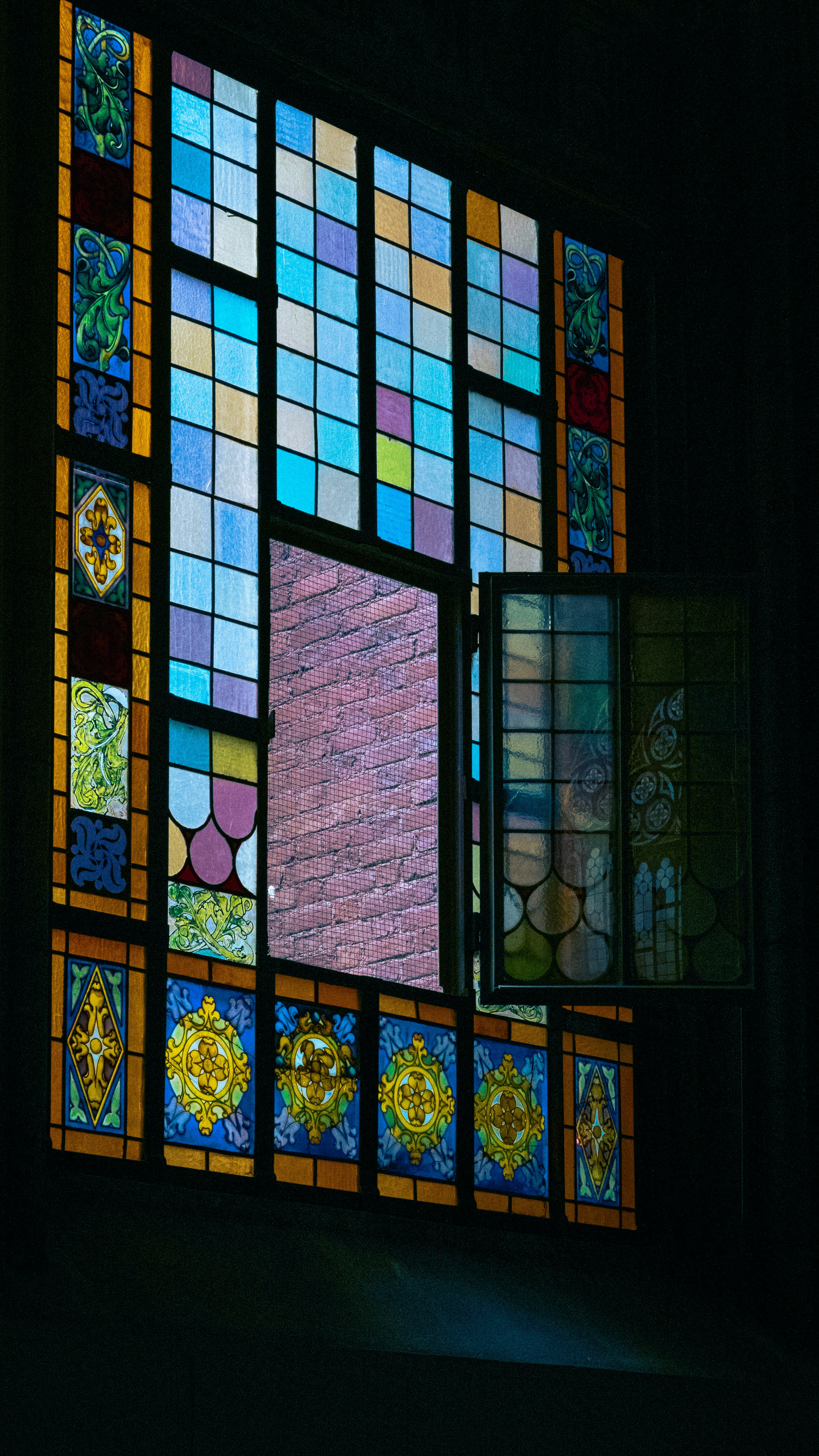 A stained glass window in a dark room photo – Free Türkiye Image on ...