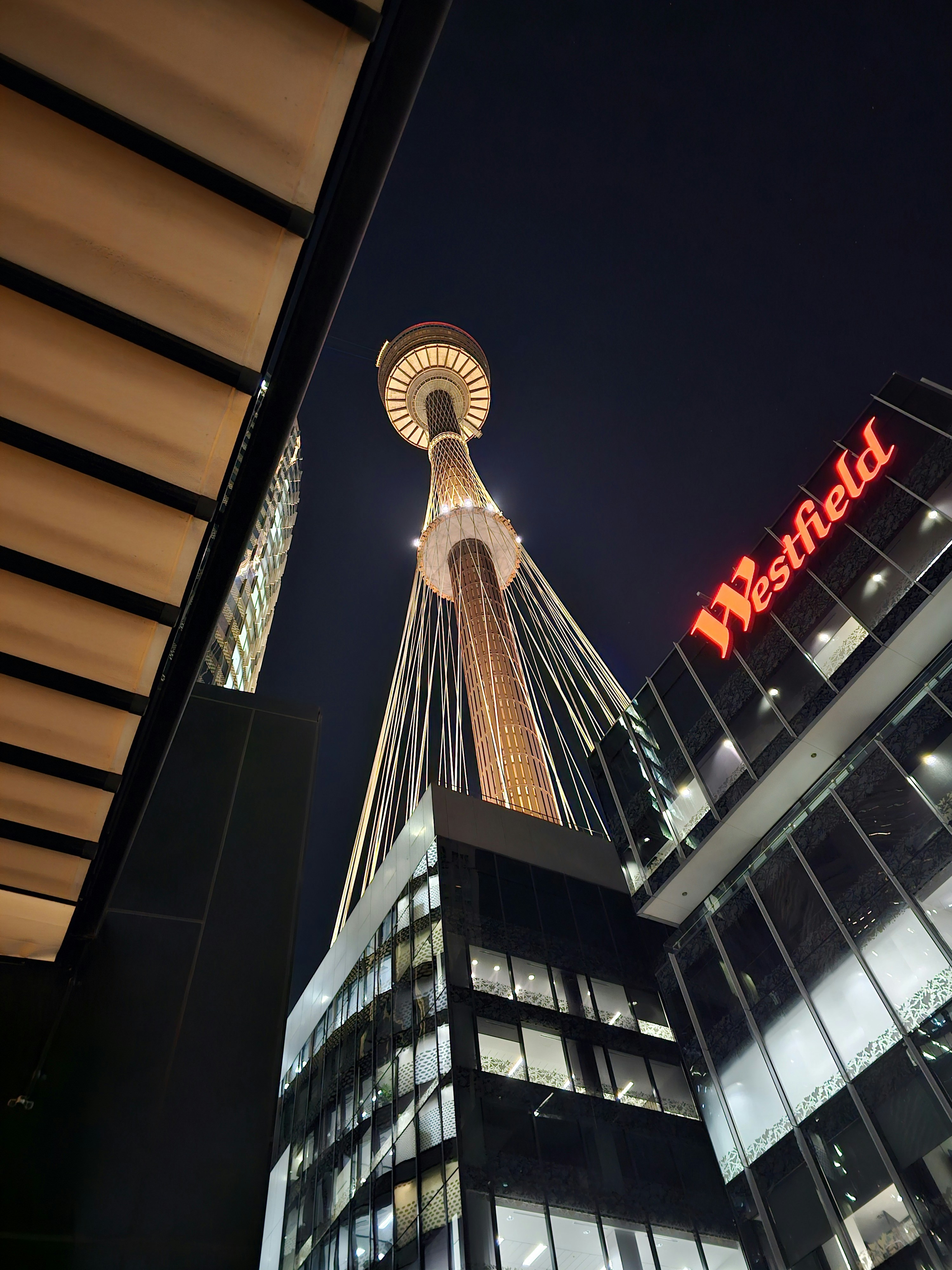 A very tall building with a very tall tower in the background photo ...