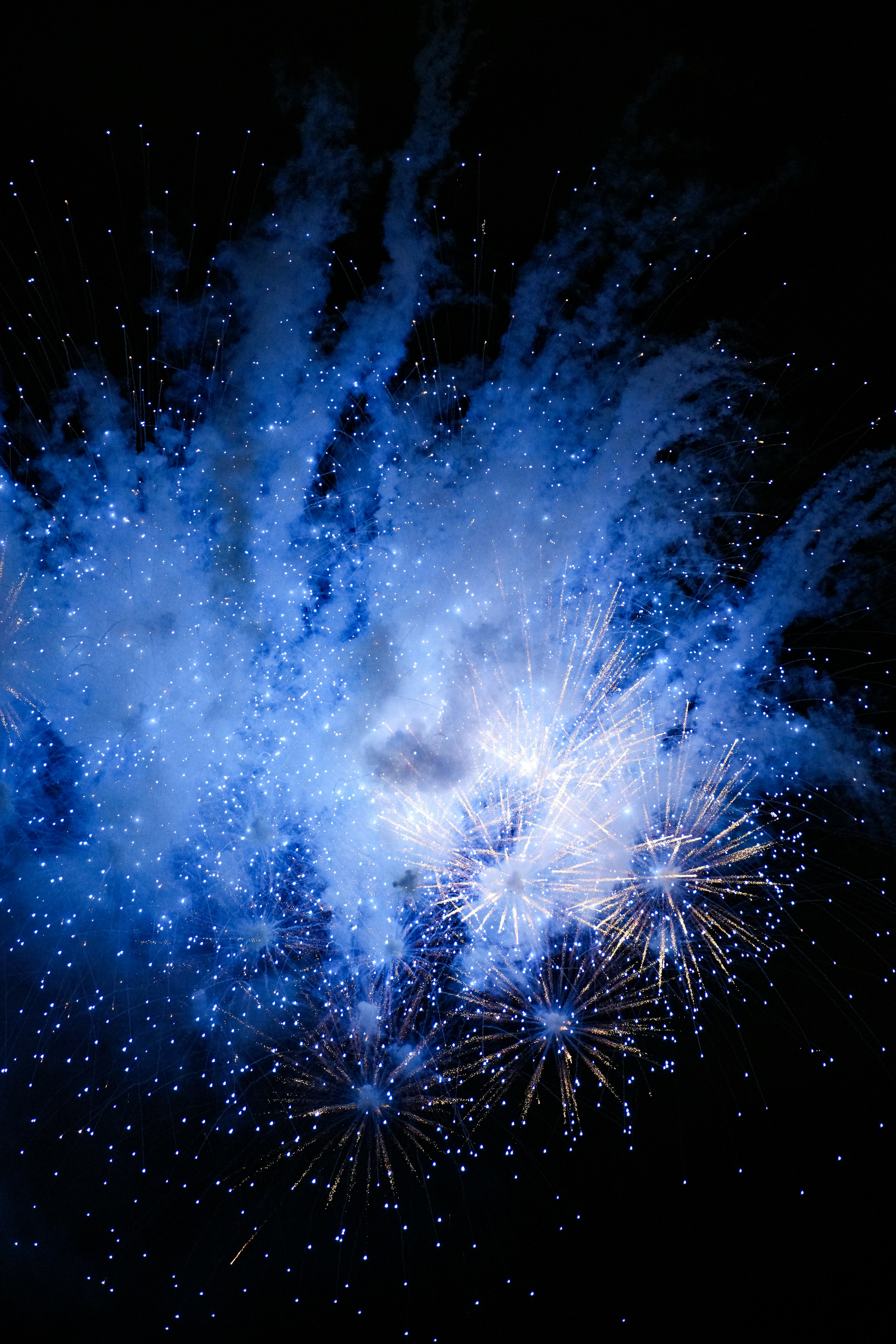 A blue firework exploding in the night sky photo – Free Space Image on ...