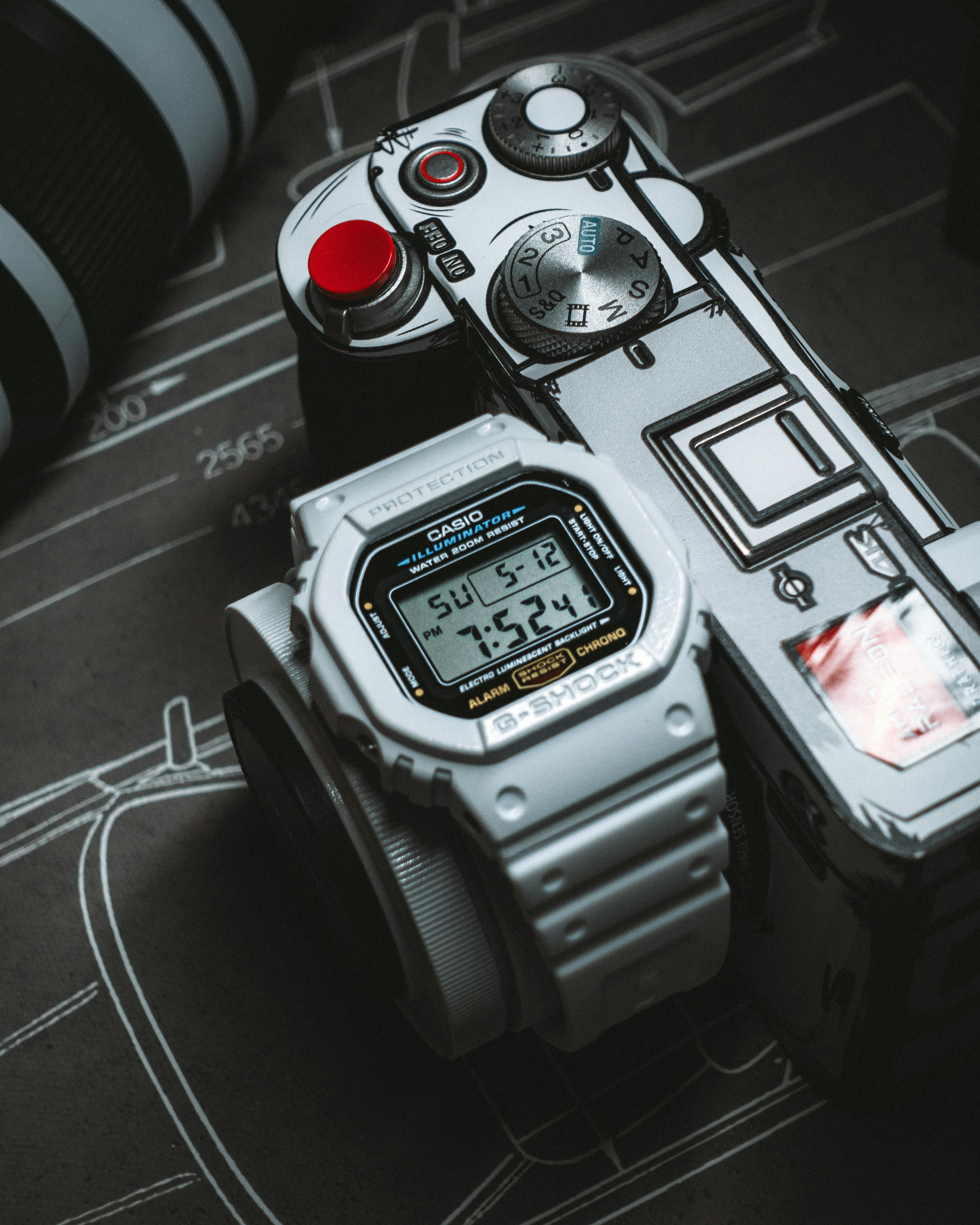 Timekeepers on Titanium: A Vintage Camera Paired with a Casio Digital Watch