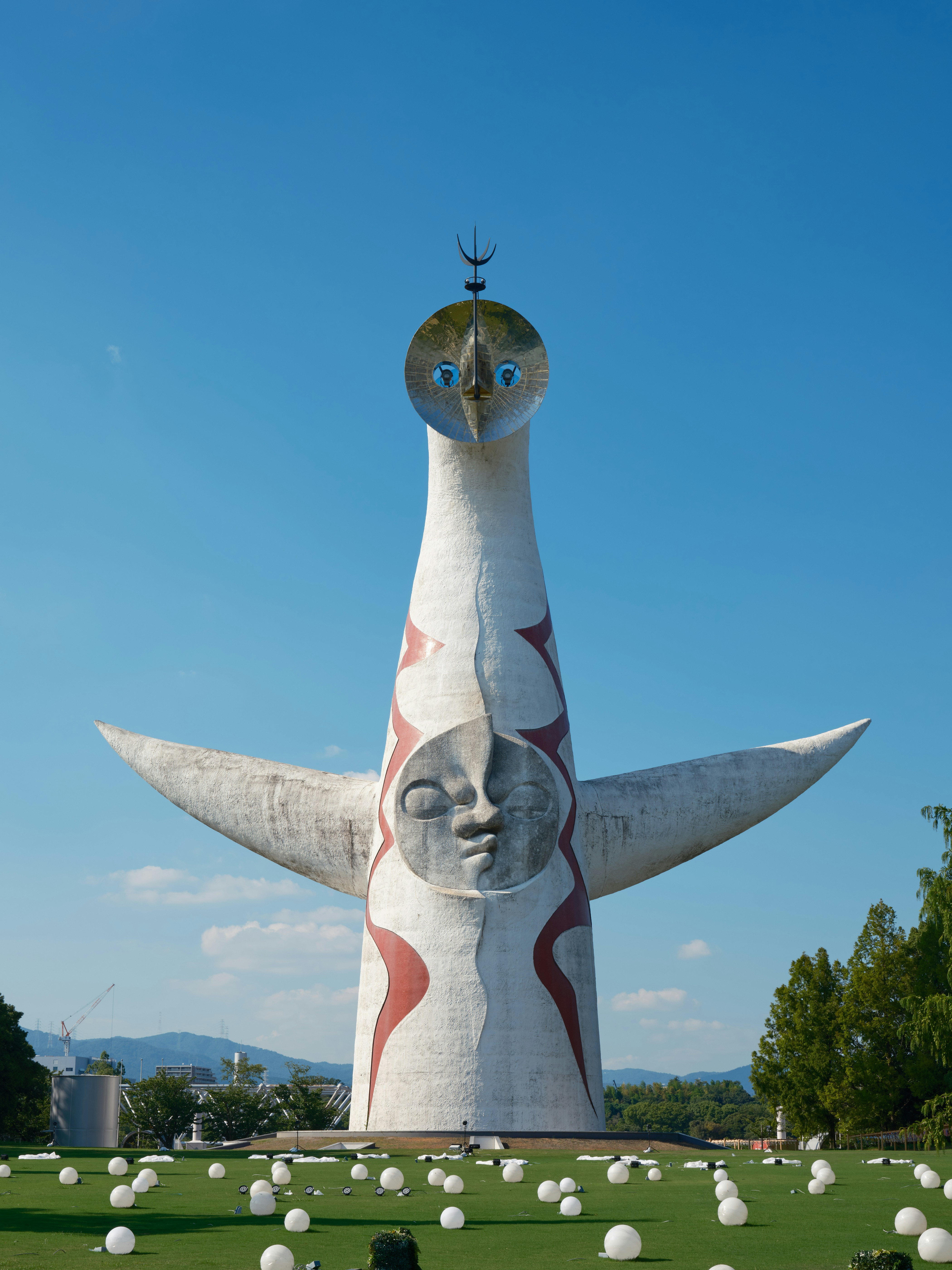 Solar Totem Over a Field of Orbs