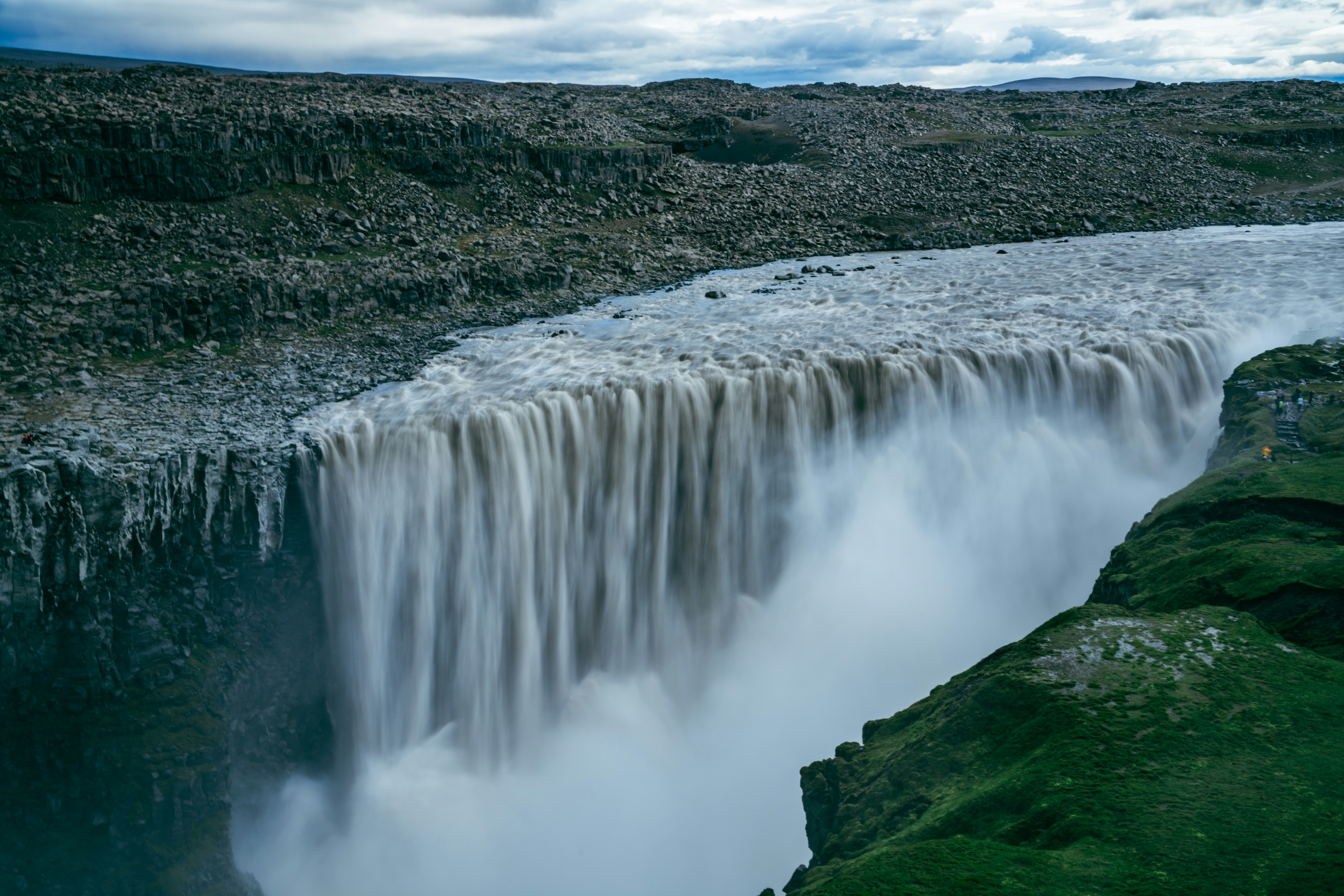 A large waterfall with water cascading over it photo – Free Dettifoss ...