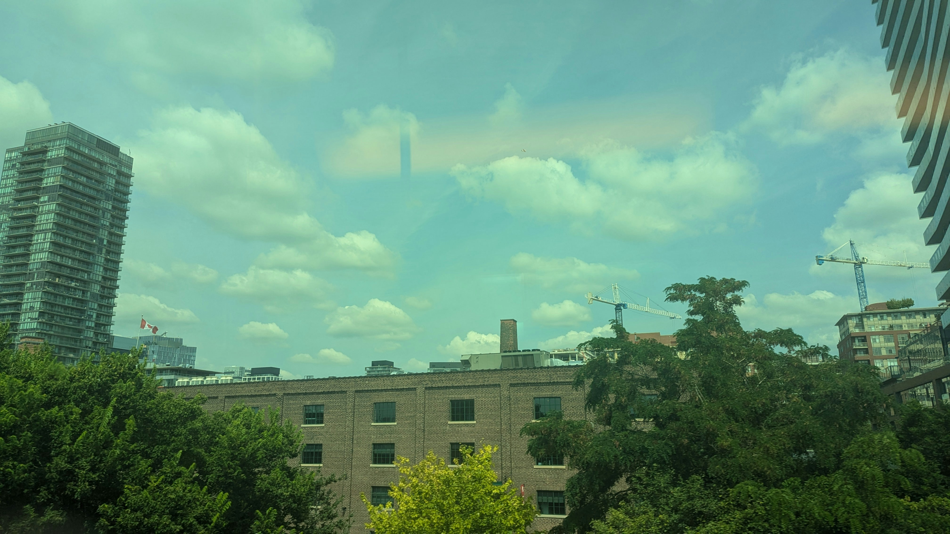 A view of a building from across the street photo – Free Nature Image ...