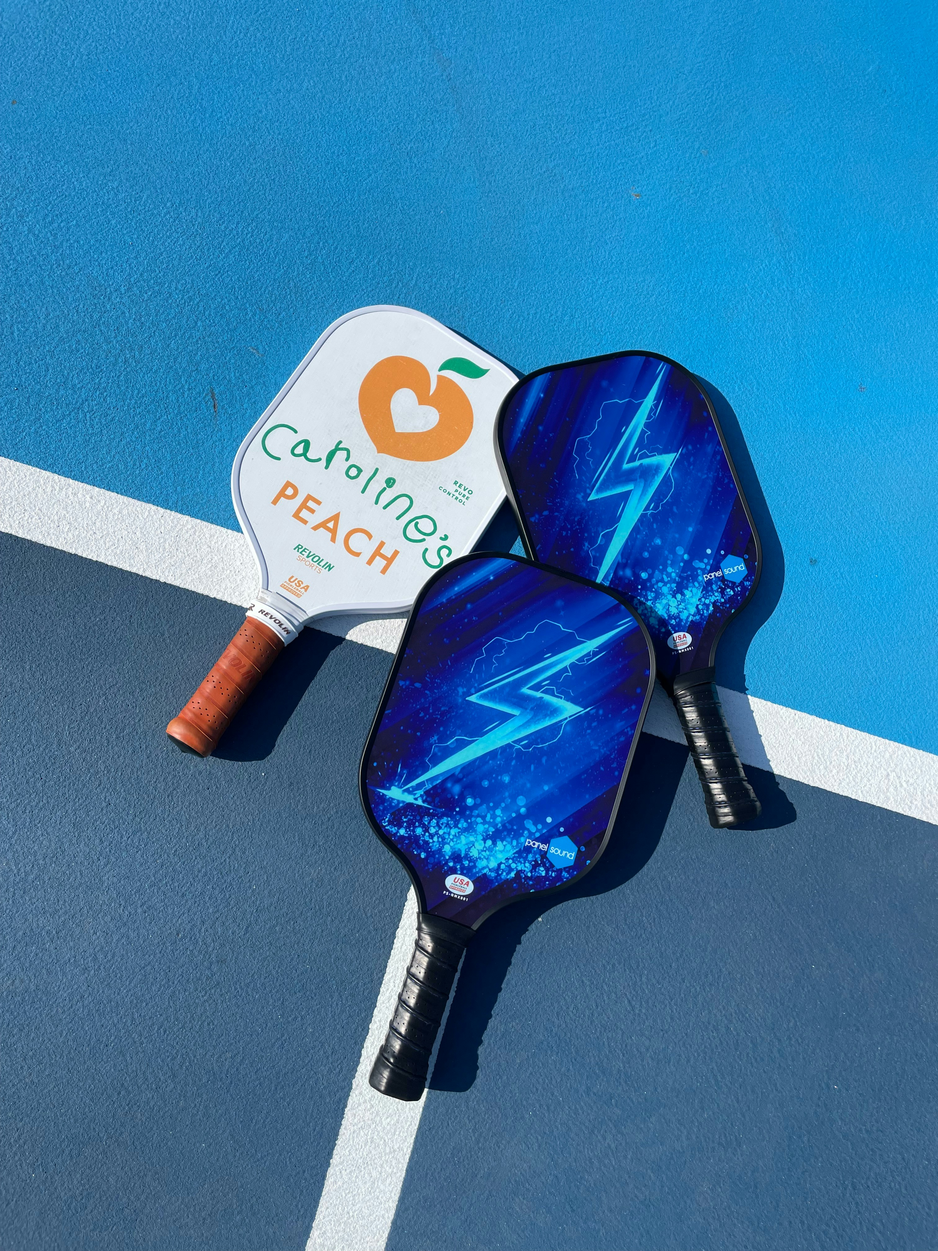 Two tennis rackets on a blue tennis court photo – Free Racket Image on ...