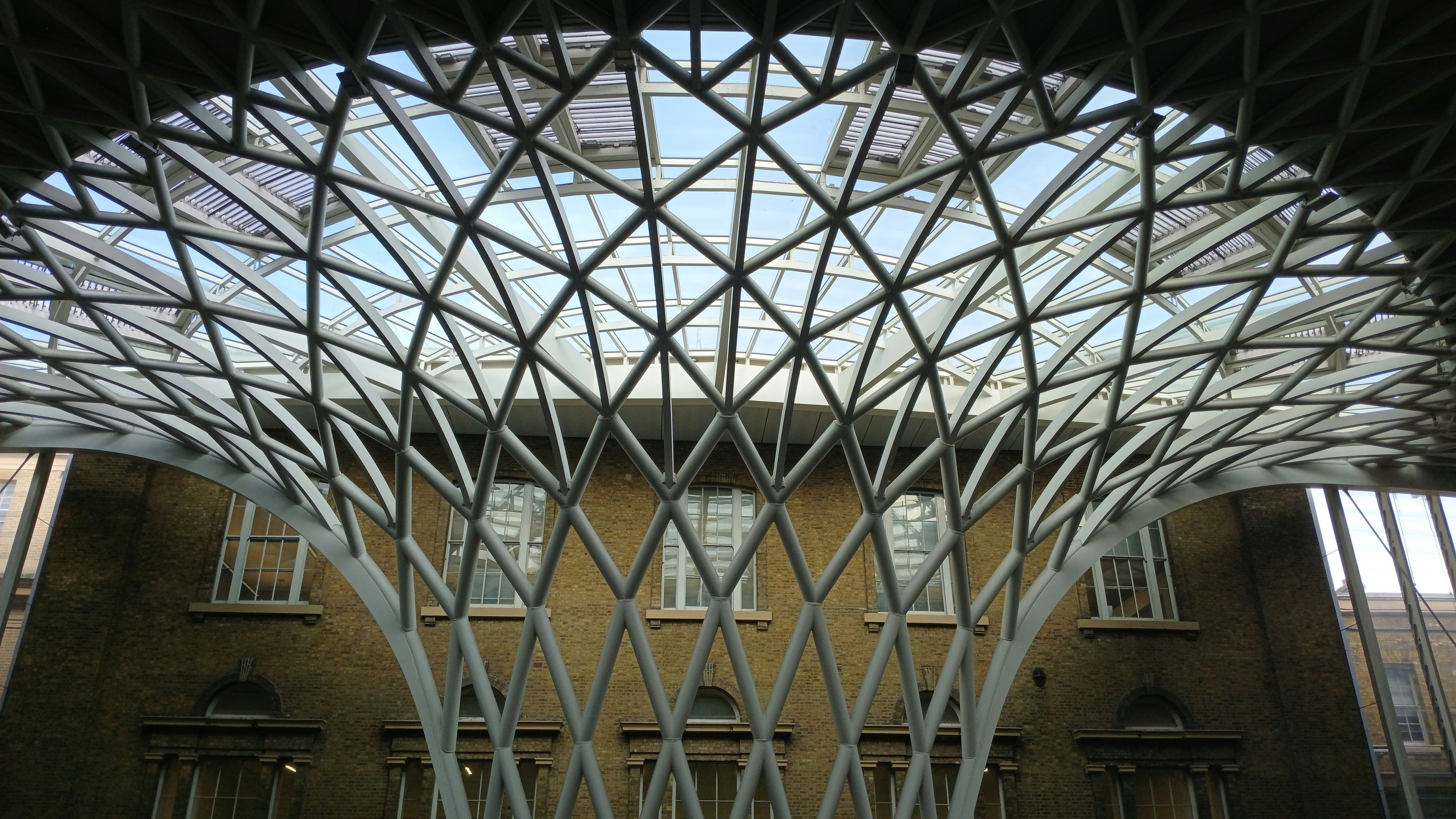 A very large building with a very tall roof photo – Free Window Image ...