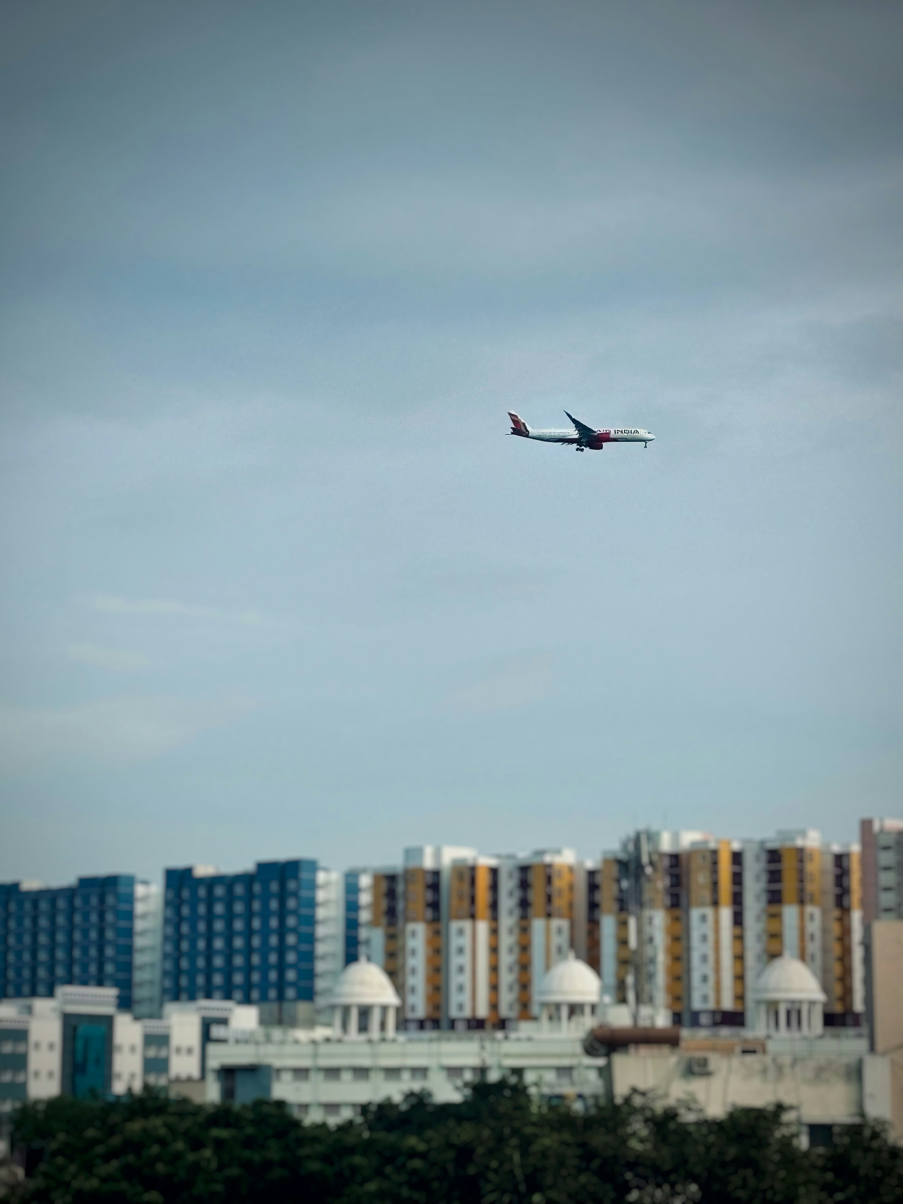Jet Over the City: A Quiet Skyline in Transition