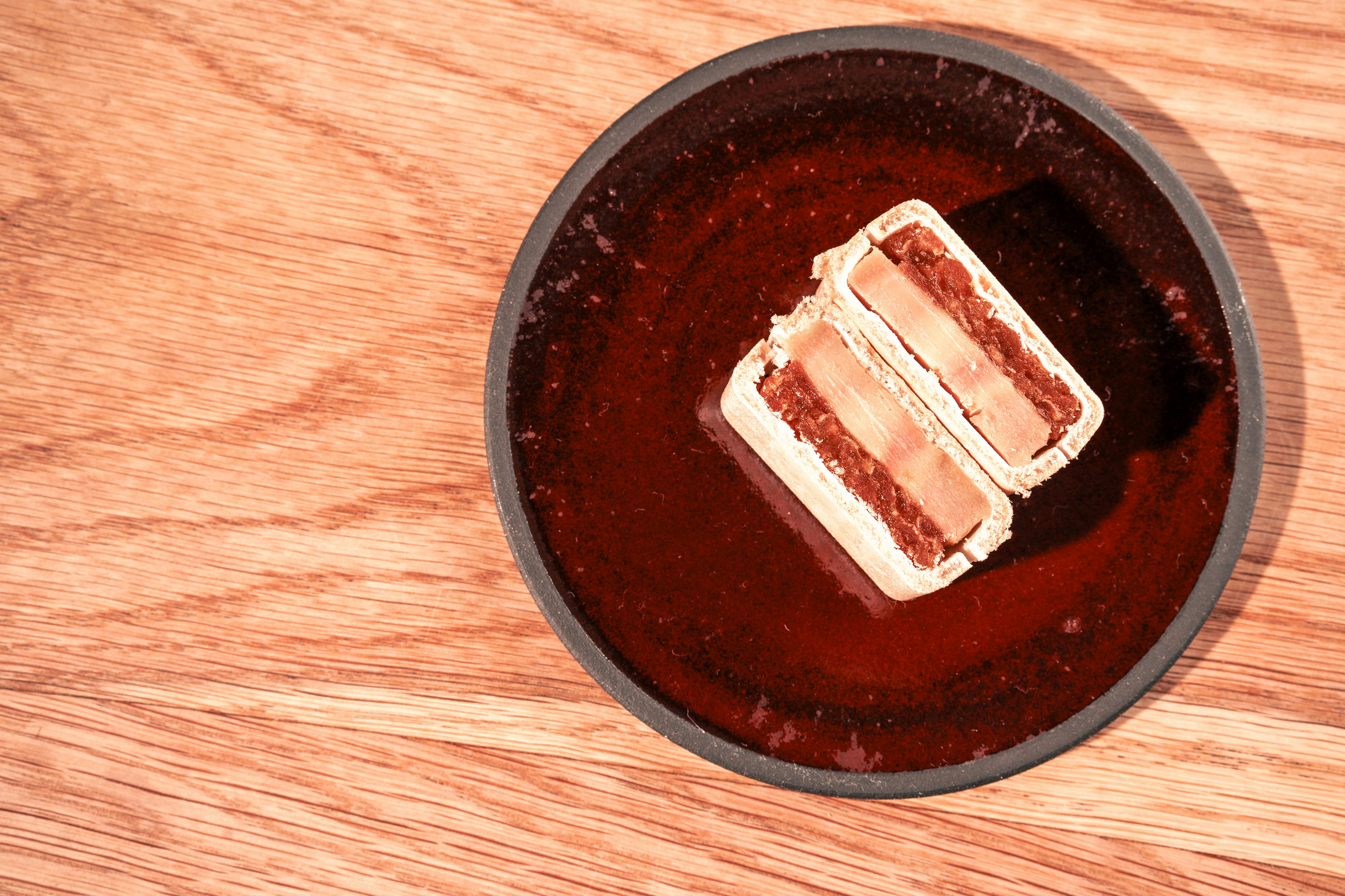 Top-Down Glaze: Petite Pastry in a Rustic Bowl