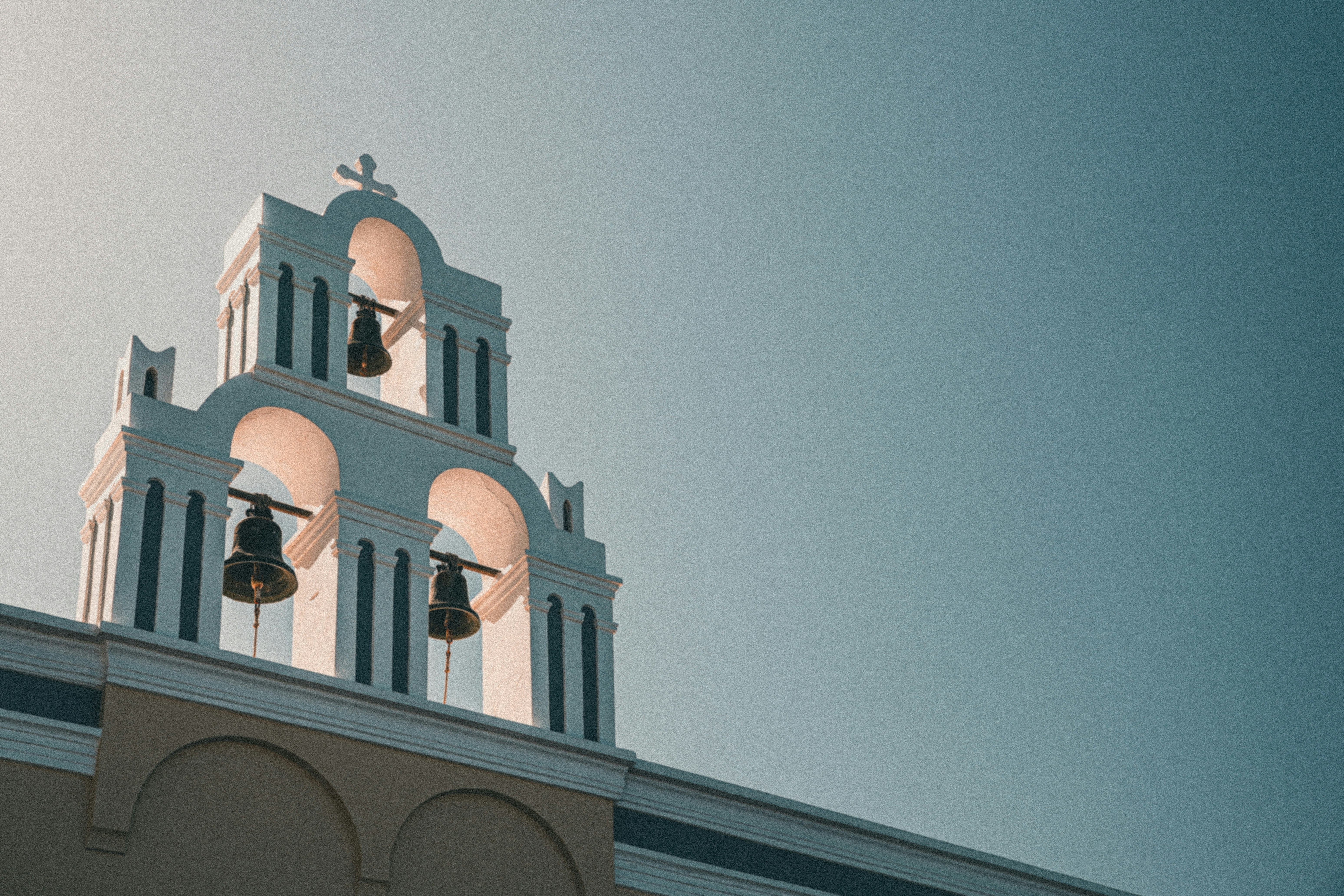 A church steeple with bells on a clear day photo – Free Greece Image on ...