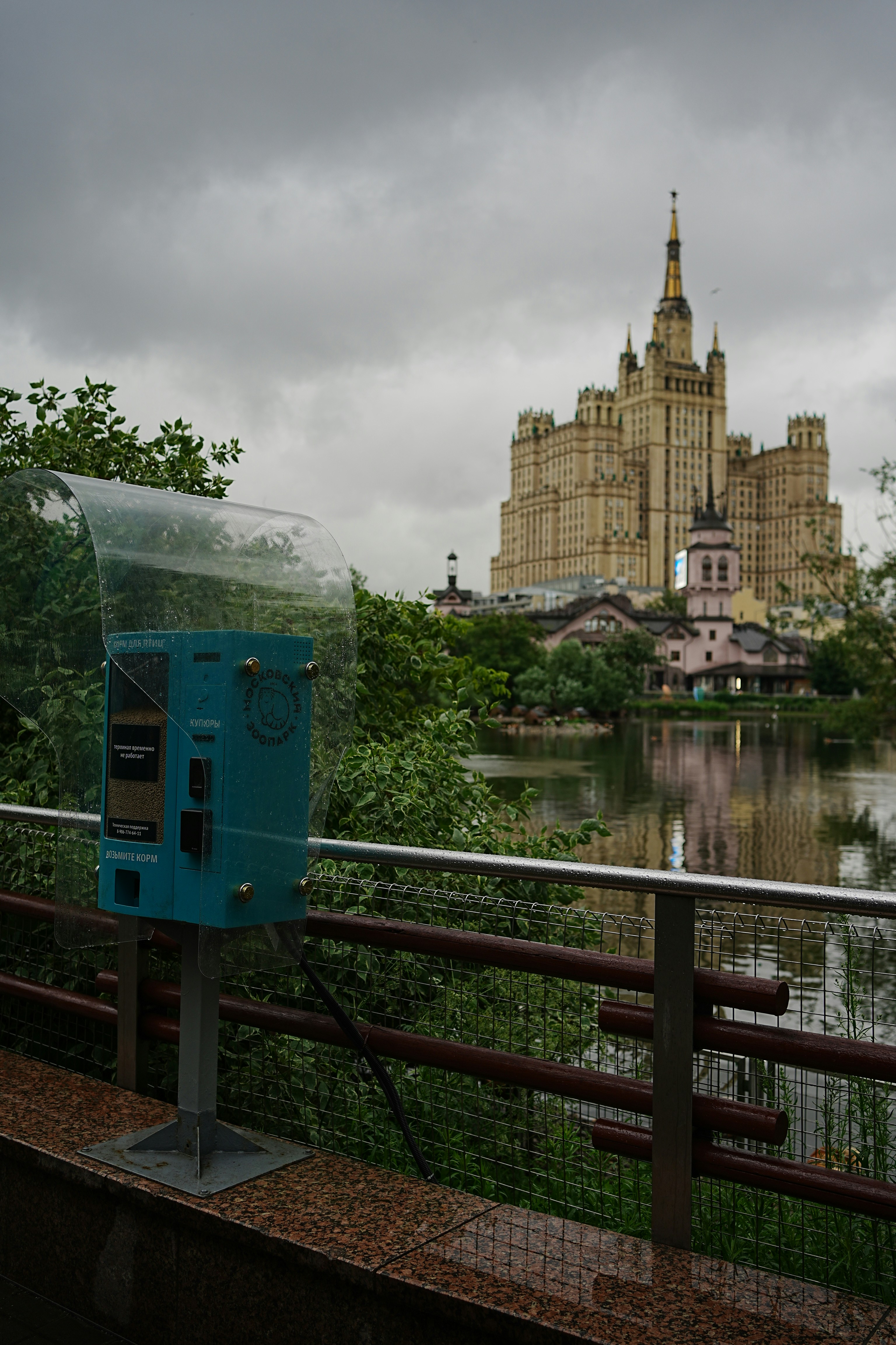 Spirefront Panorama: A pale tower rising over a tranquil river