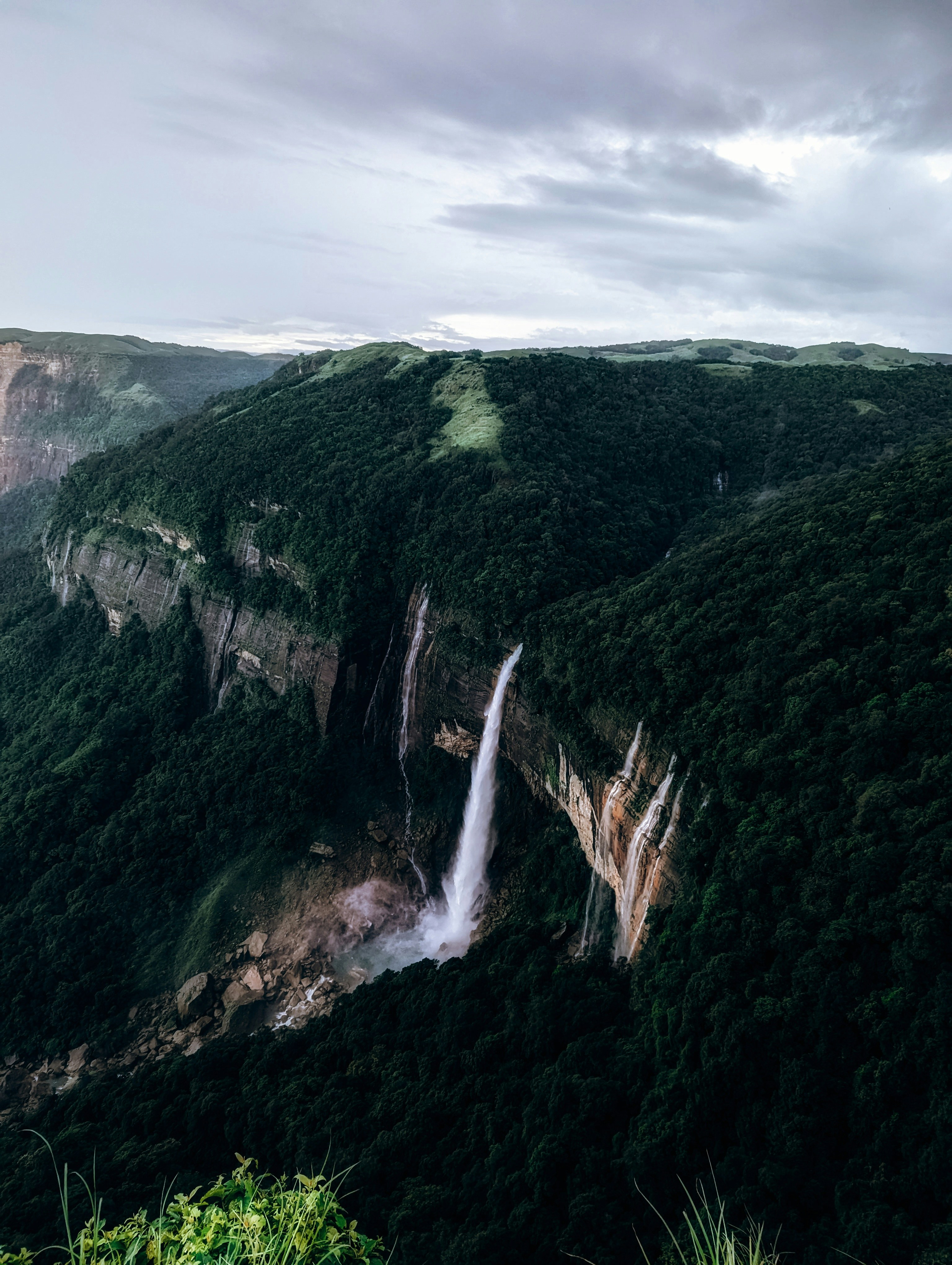A view of a waterfall from a high point of view photo – Free Nohkalikai ...