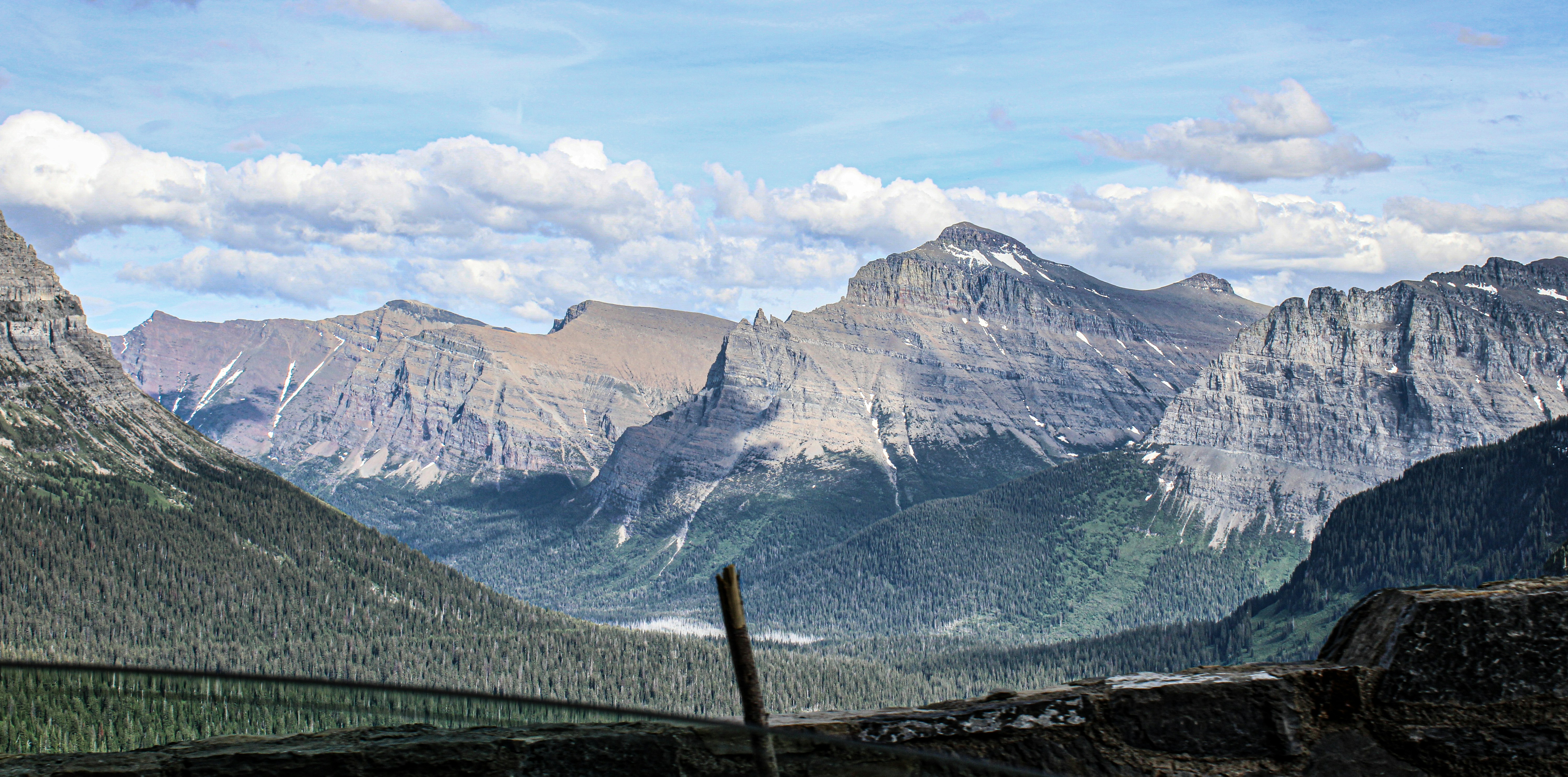 Snow-Capped Peaks Framed by a Quiet Valley