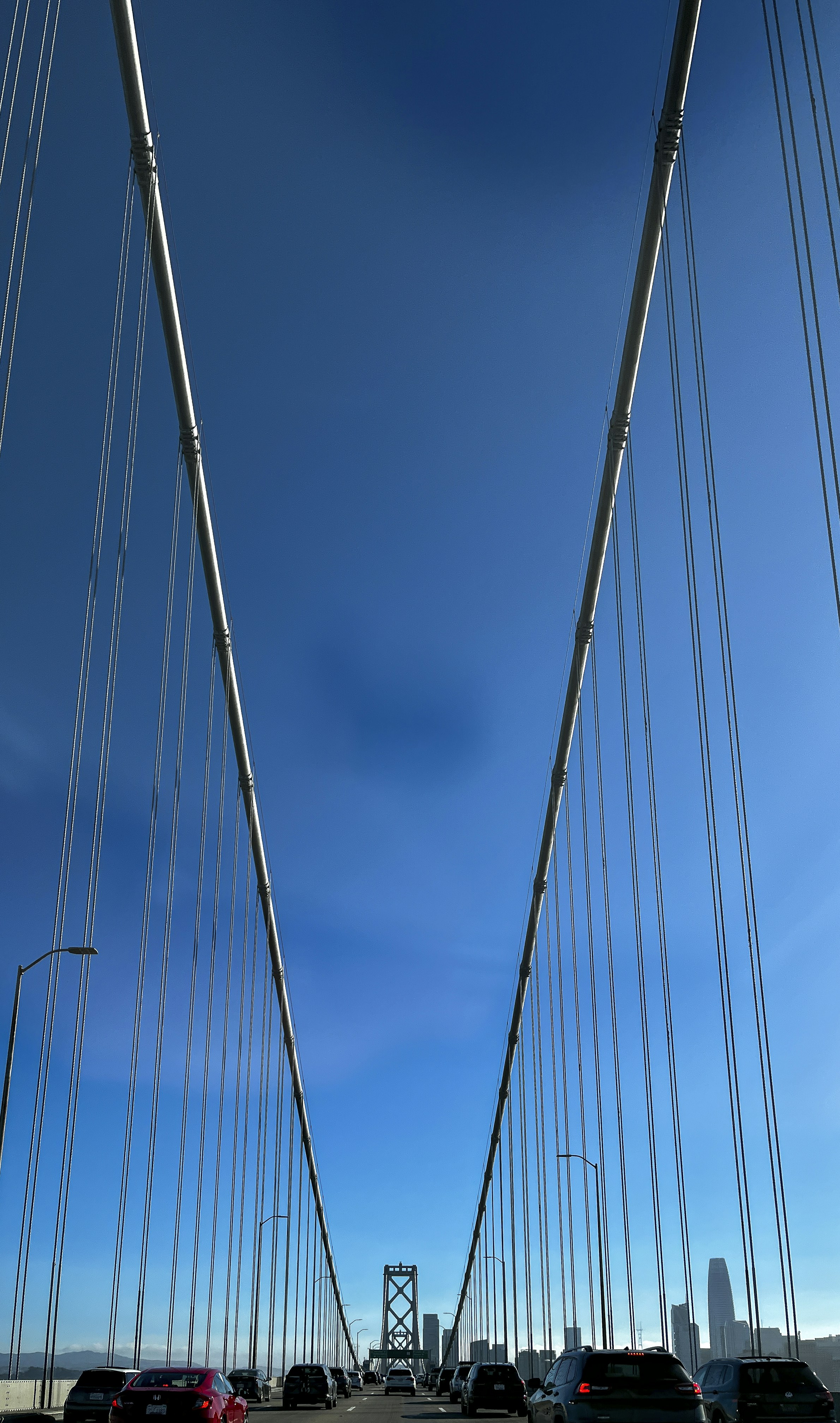 A view of a bridge with cars driving across it photo – Free San ...