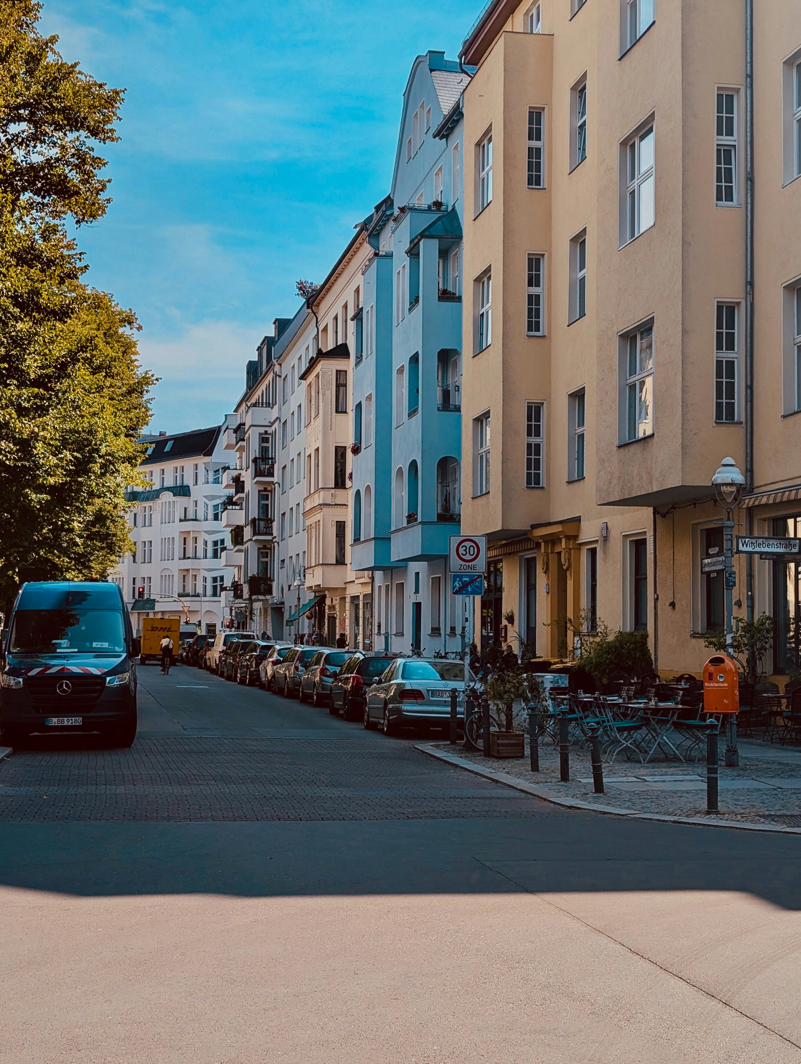 Pastel Row: A Sunlit Street Full of Quiet Color