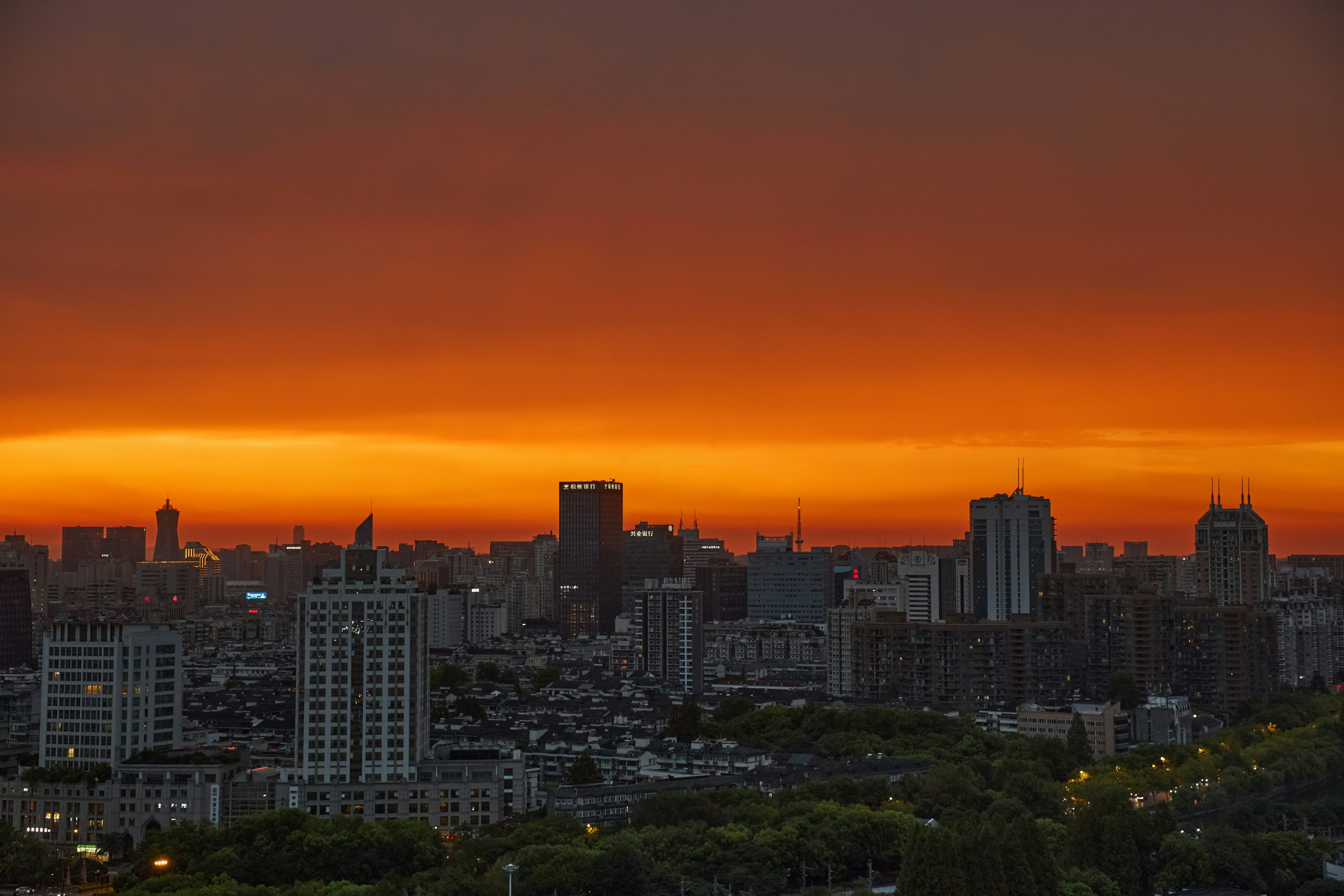 Ember Horizon Over a Sleeping City at Dusk