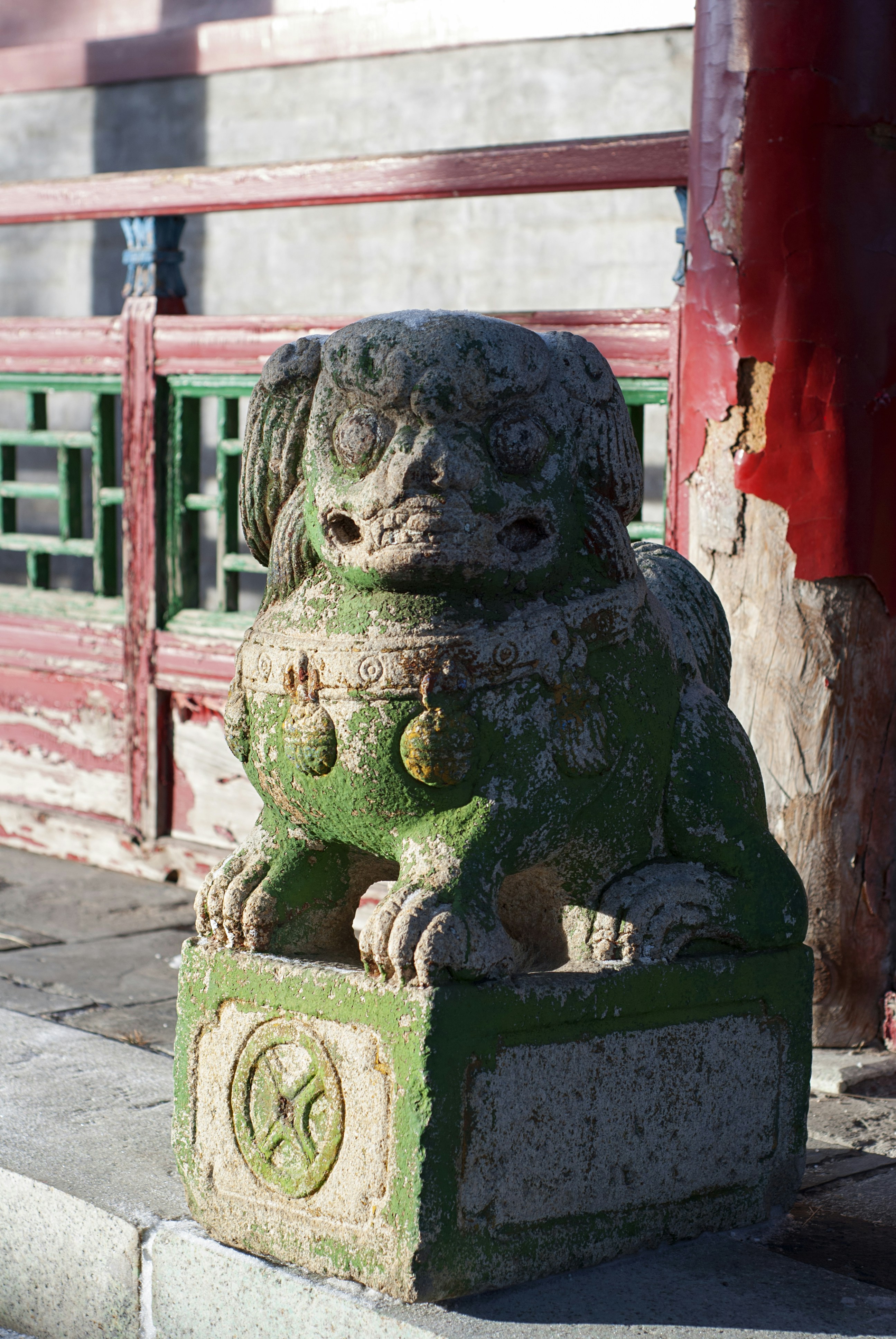 Moss-Covered Guardian Foo Dog at Temple Steps