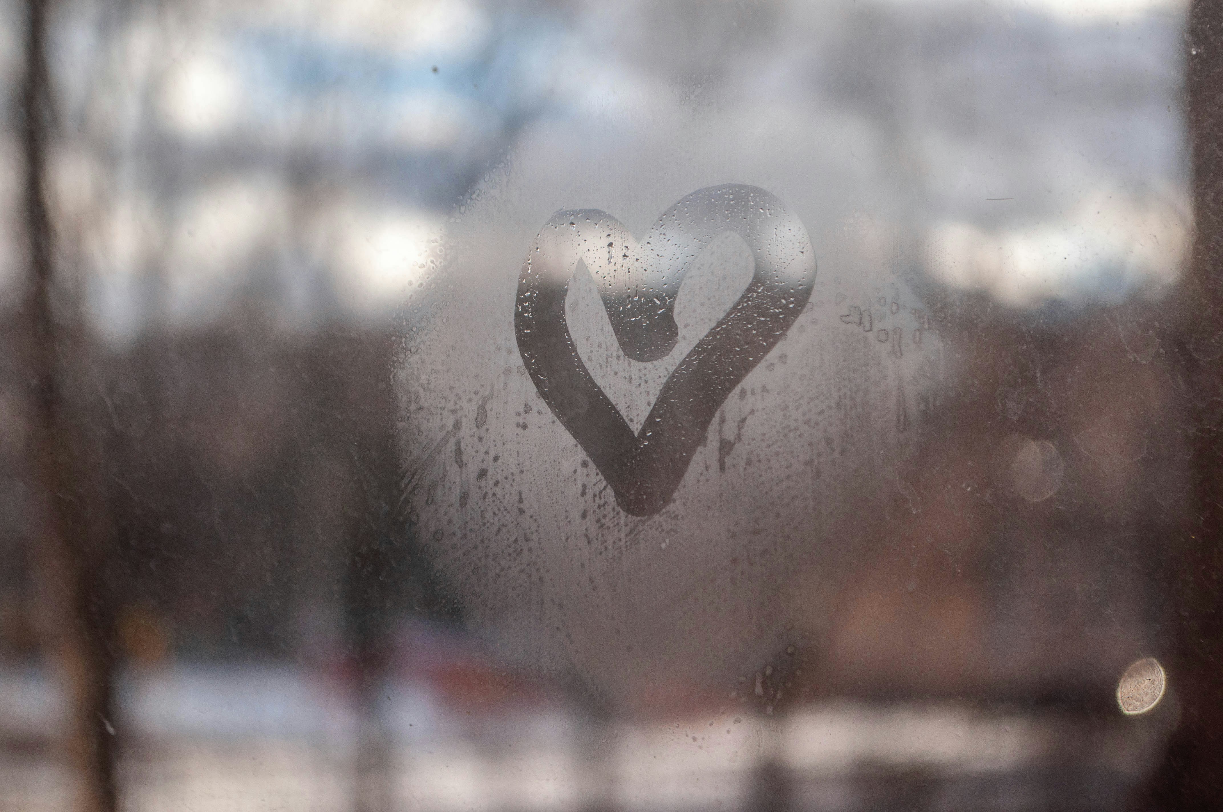 A window with a heart drawn on it photo – Free Moon Image on Unsplash