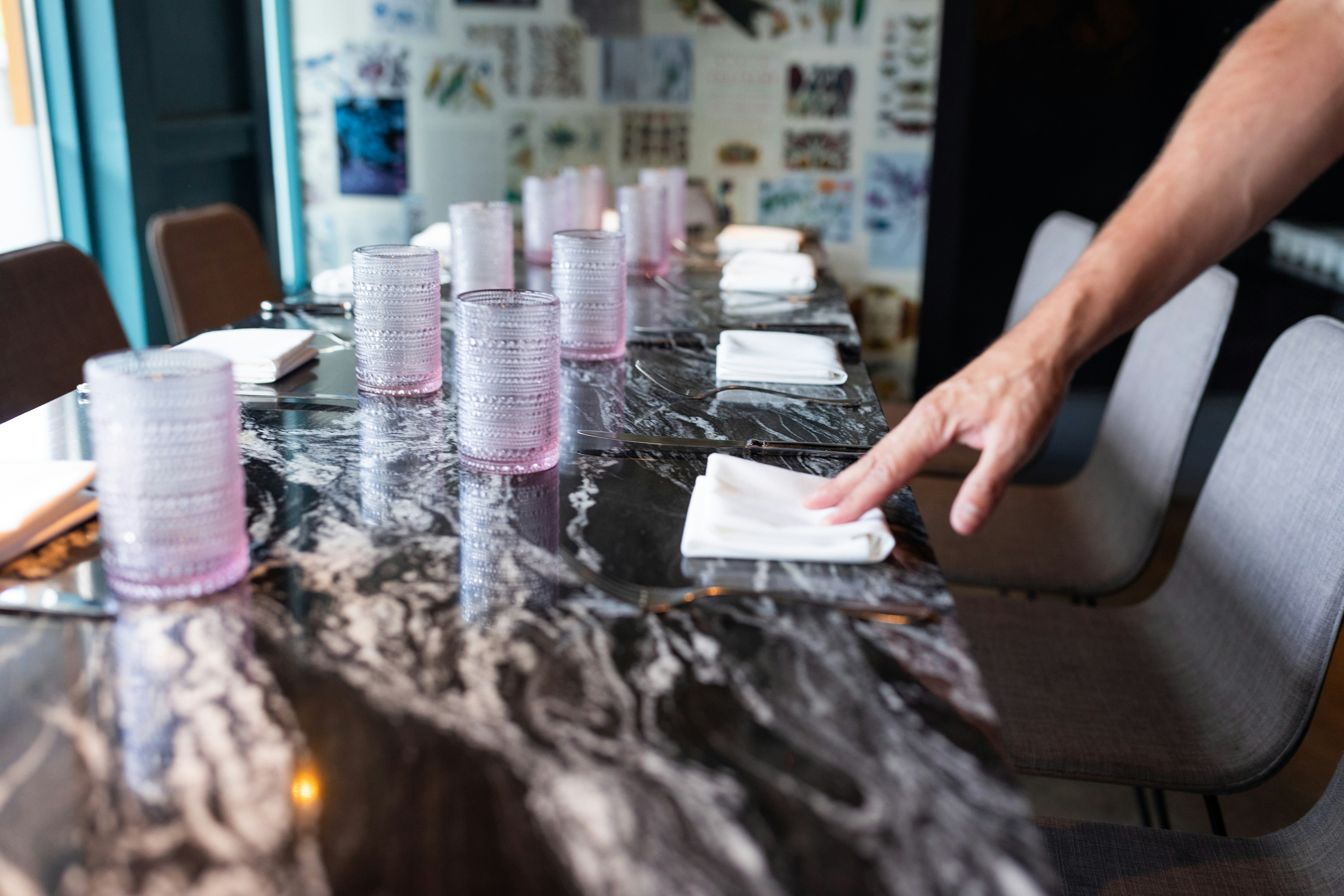A person reaching for a napkin on a table photo – Free Usa Image on ...