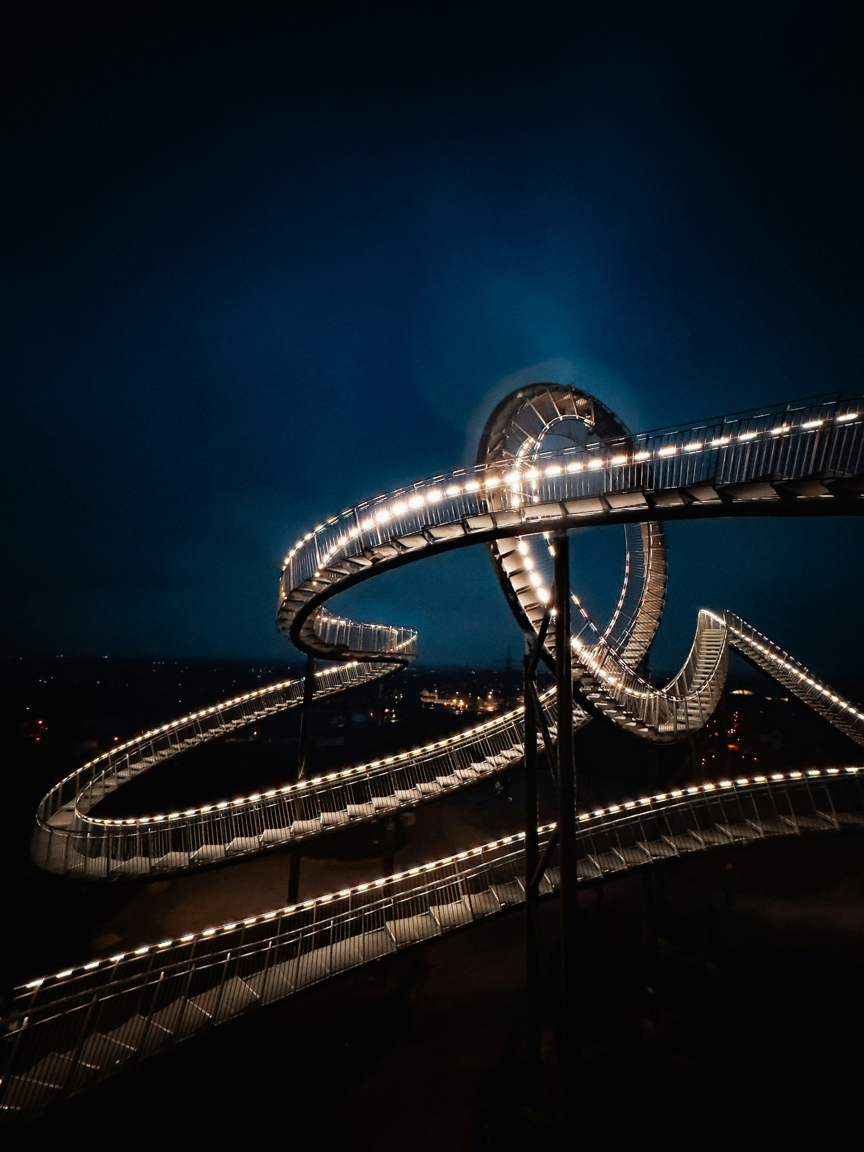 Neon Serpent on Night Rails: A Spiraling Lightscape