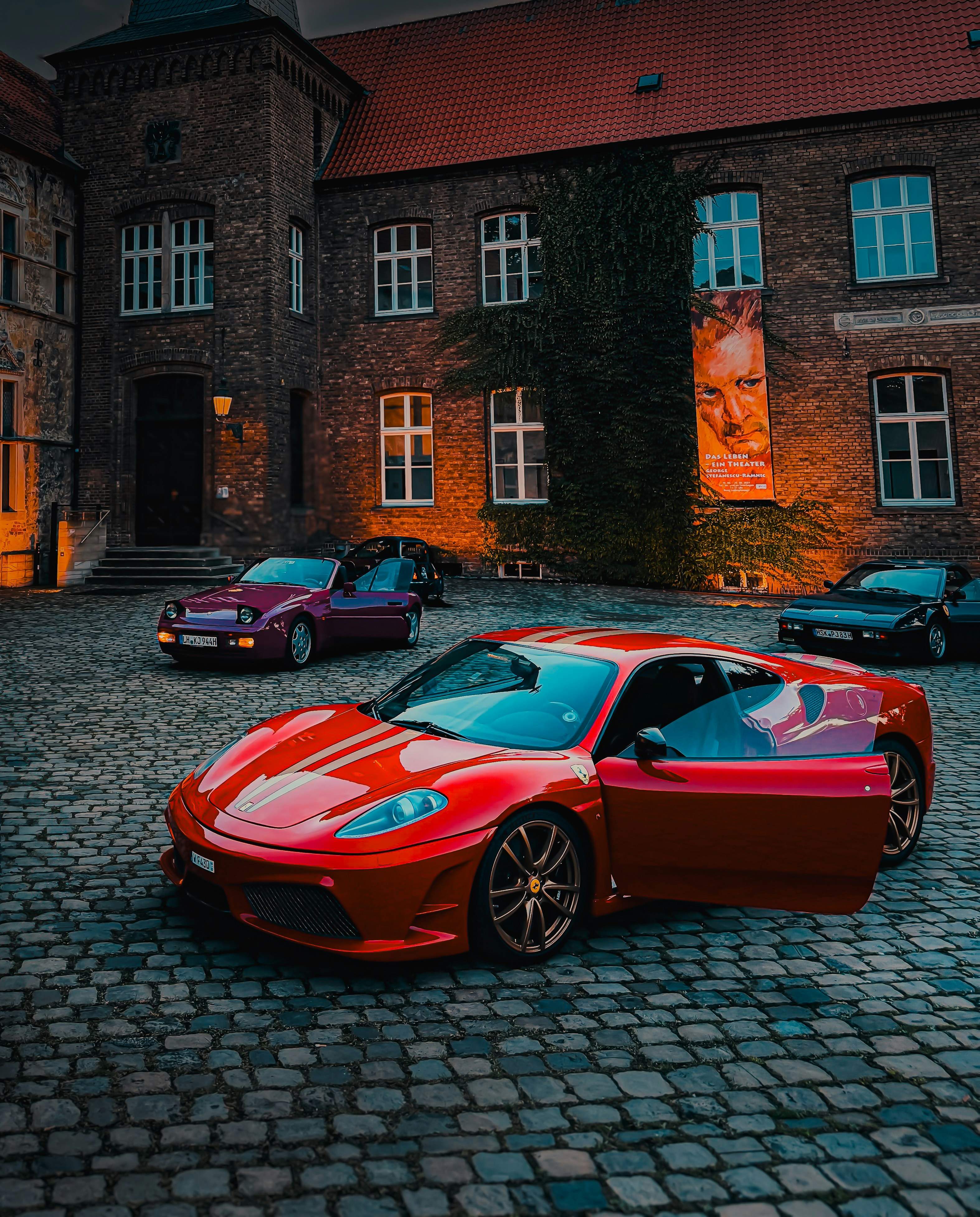 Crimson Exotics on Cobblestones: The Red Jade in a Castle Courtyard