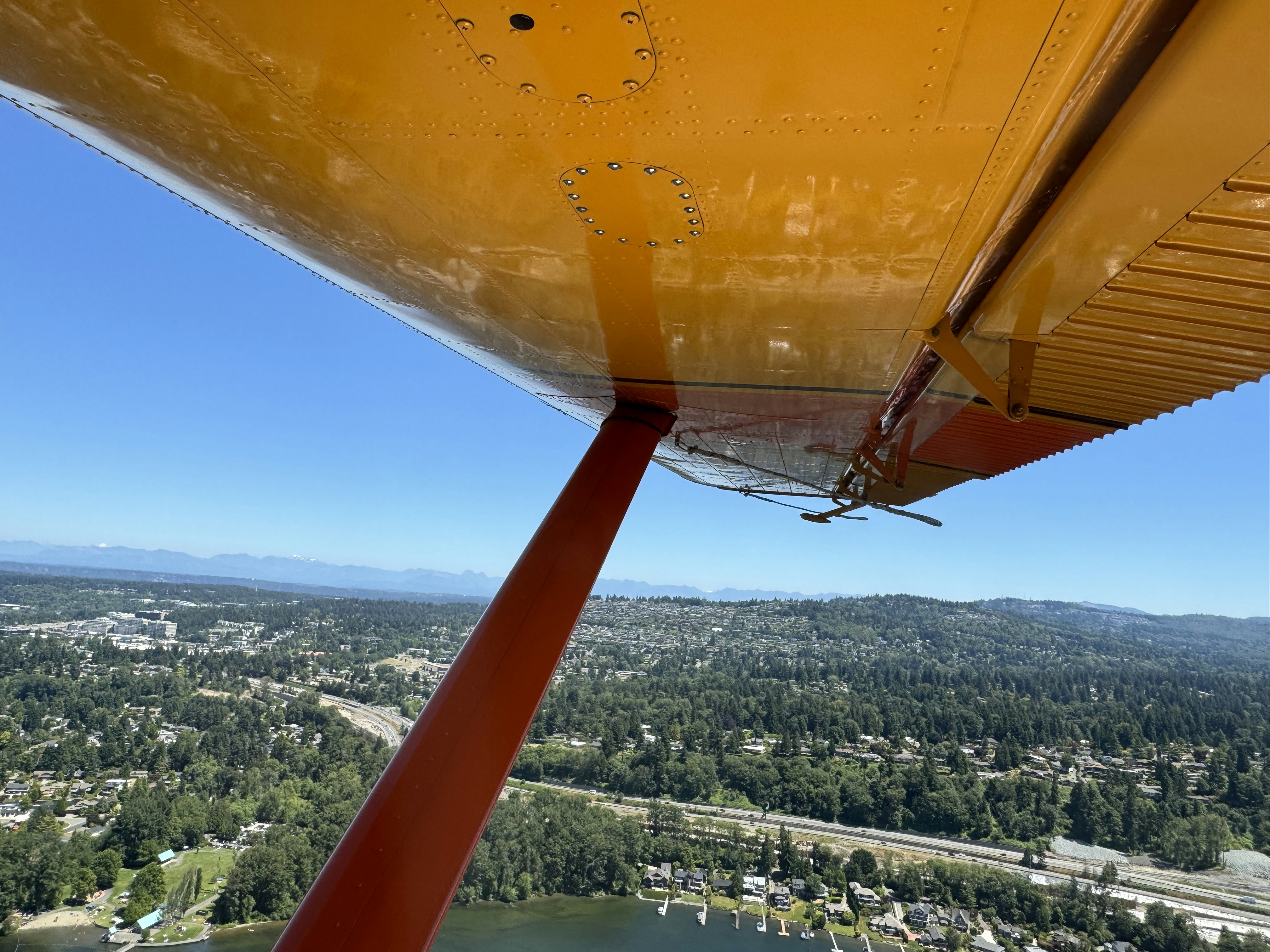 Copper Wing over a Green Spine: Aerial Portrait of a Suburban Valley