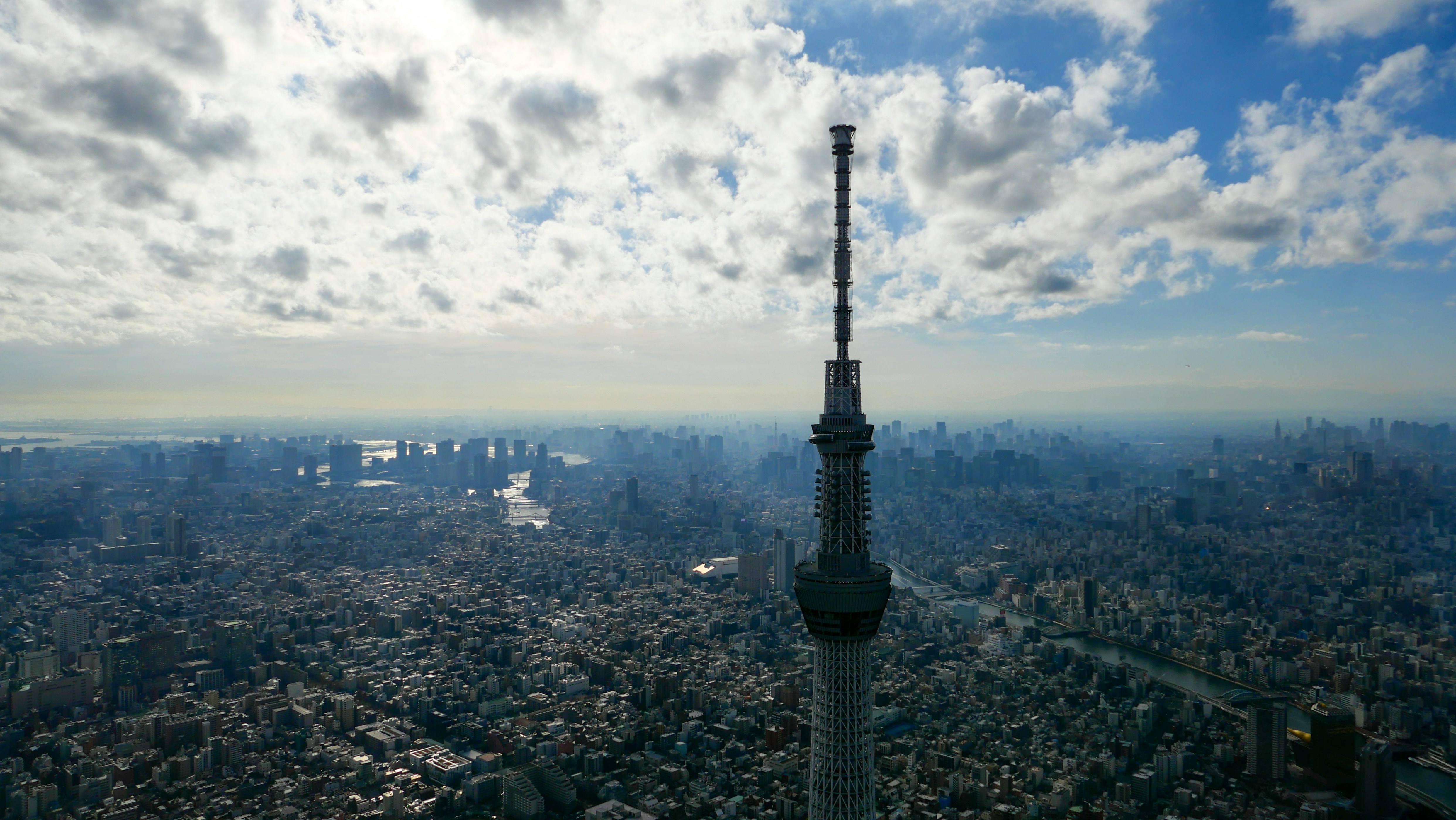 A view of a city from the top of a building photo – Free Tower Image on ...