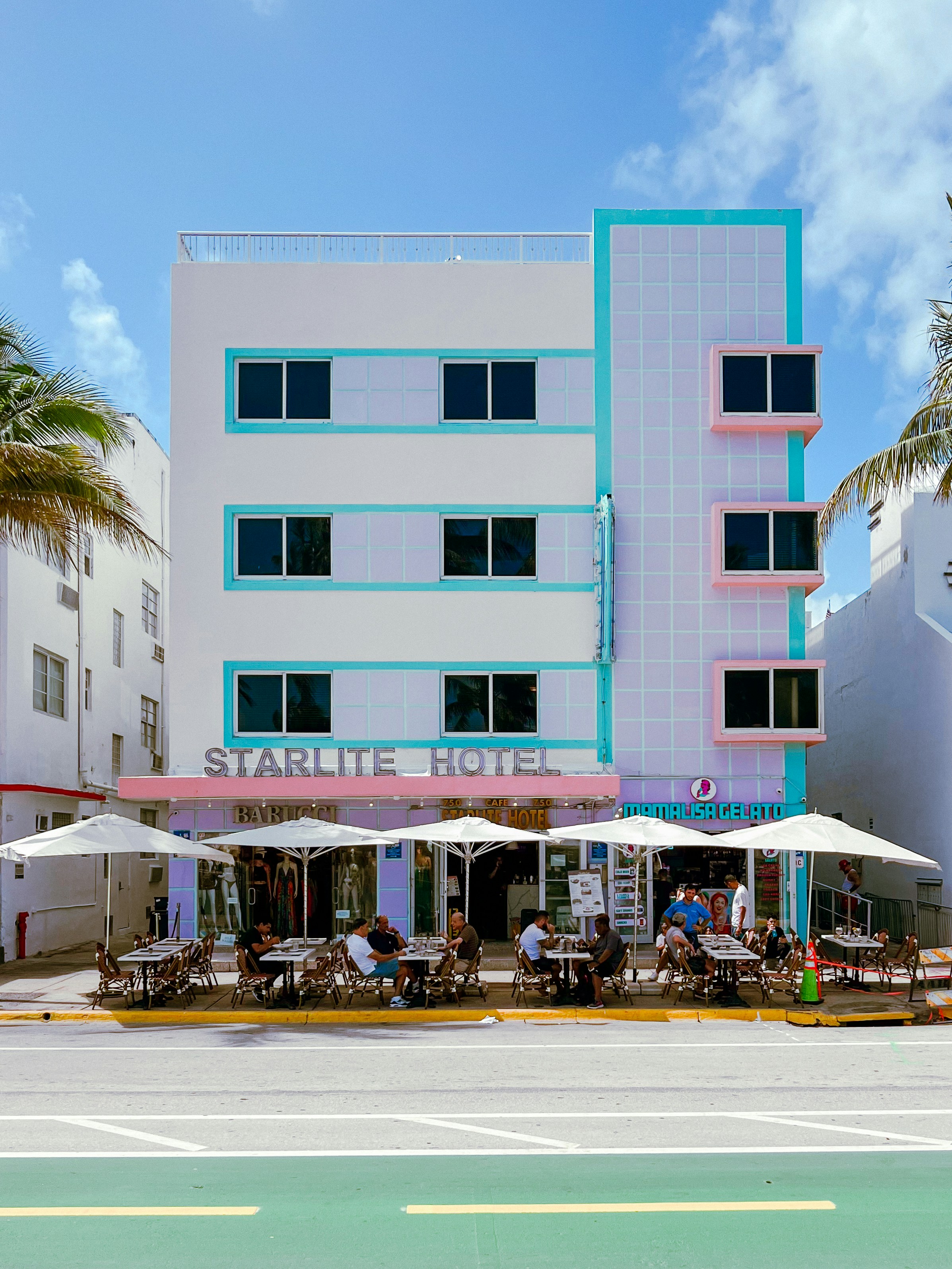 Starlite Hotel: Pastel Facade Framed by Alfresco Dining
