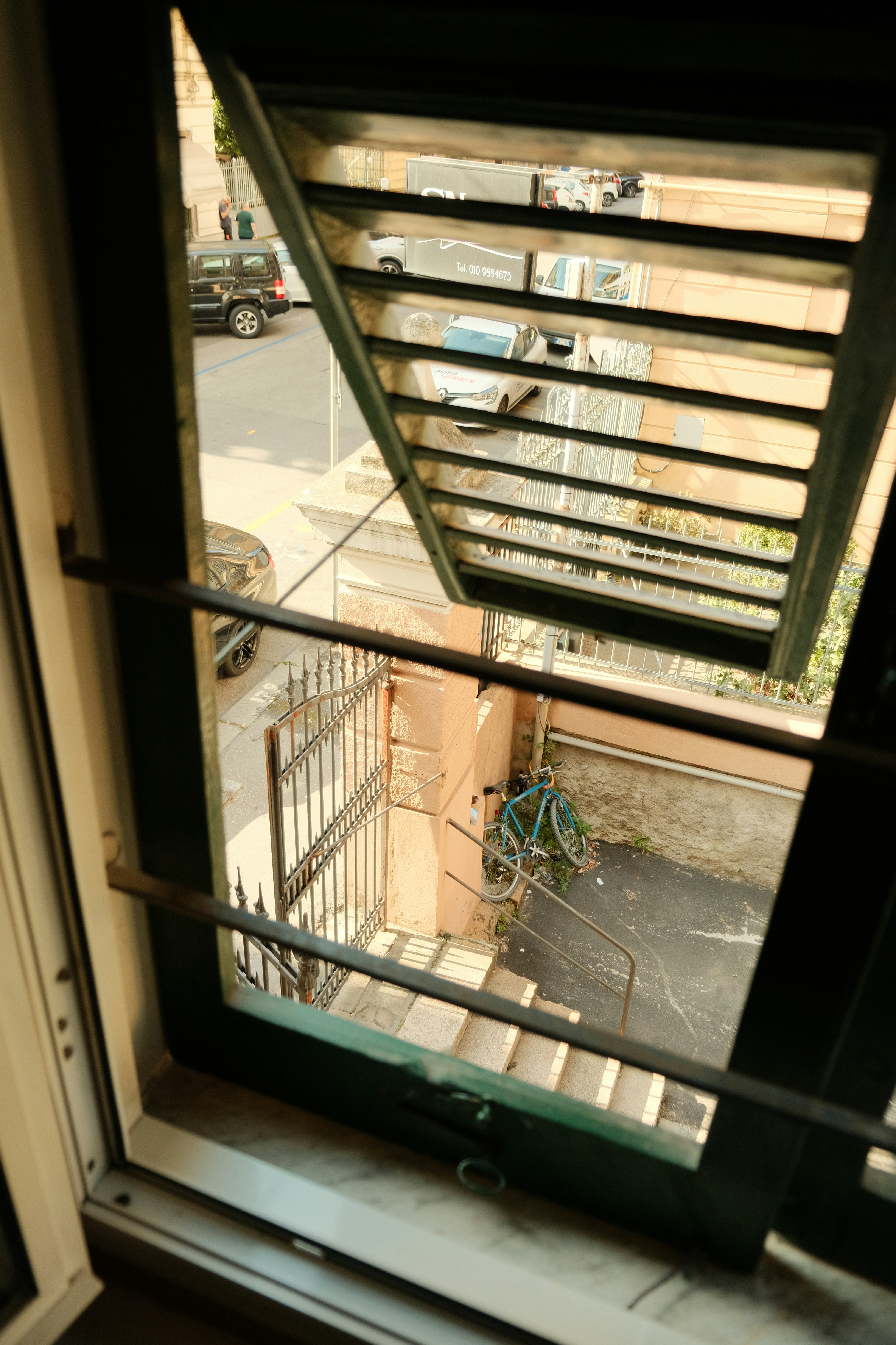An open window with a view of a parking lot photo – Free Italy Image on ...