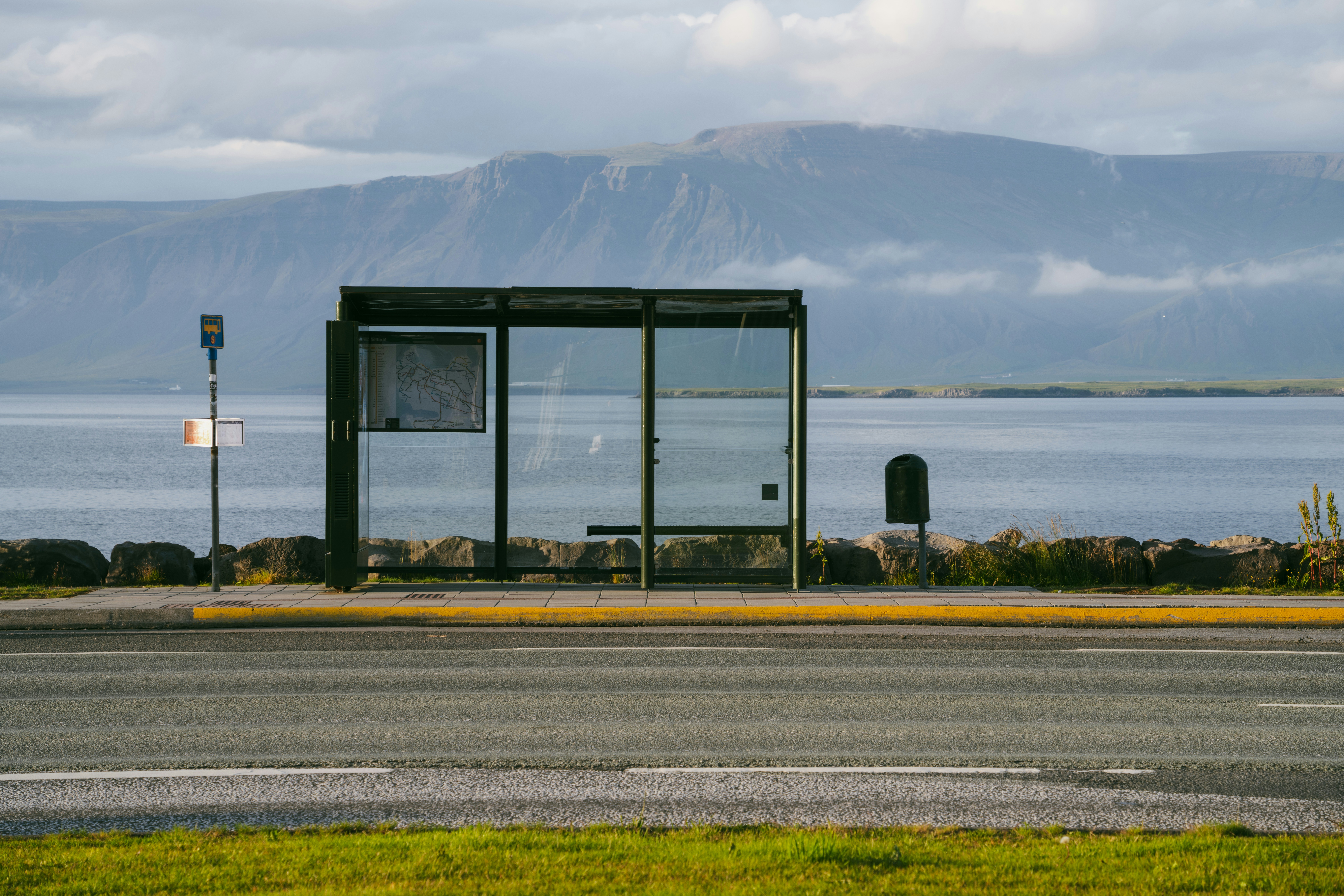 A bus stop sitting on the side of a road photo – Free Iceland Image on ...