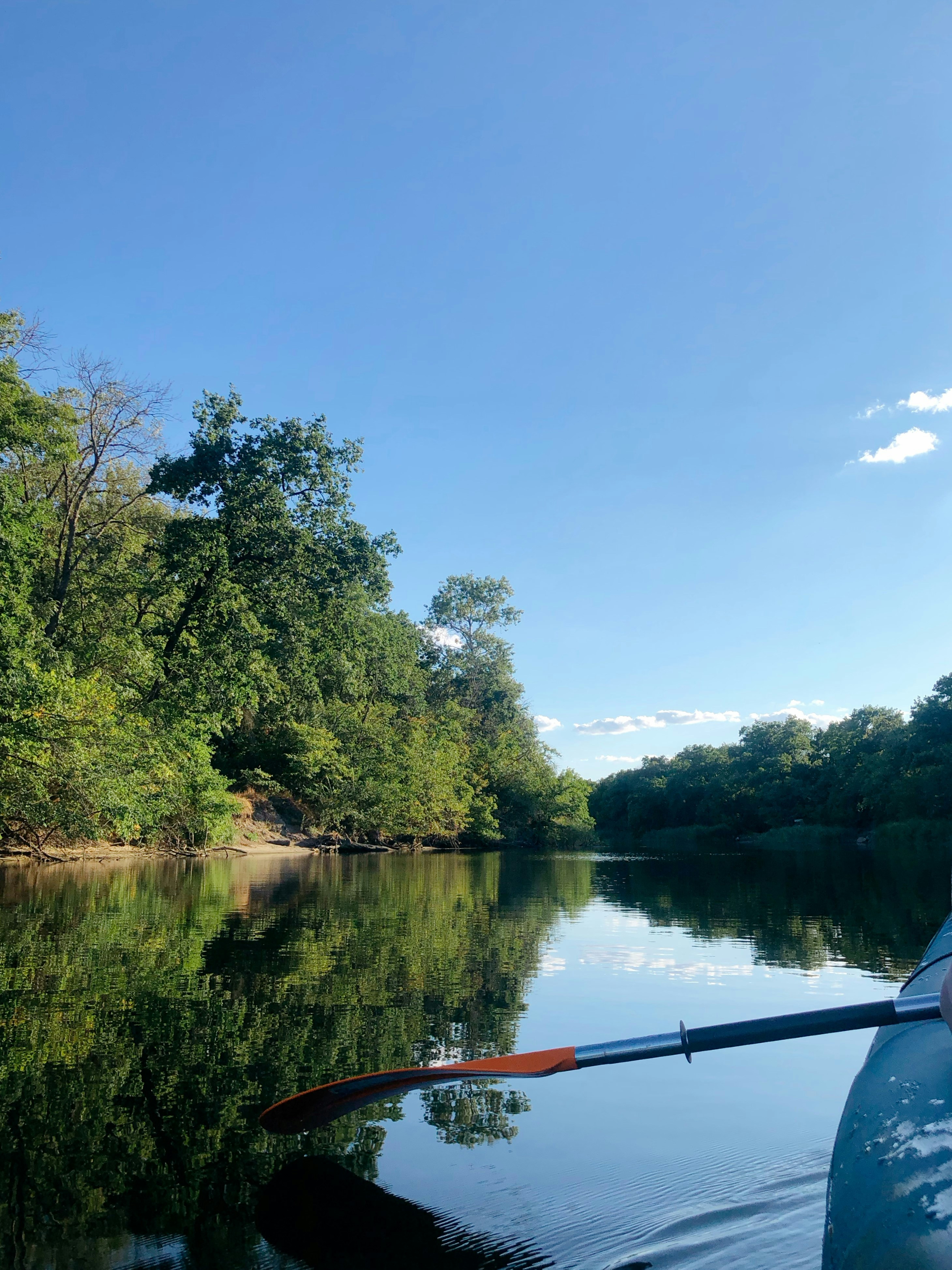 A person paddling a canoe down a river photo – Free Wallpaper Image on ...
