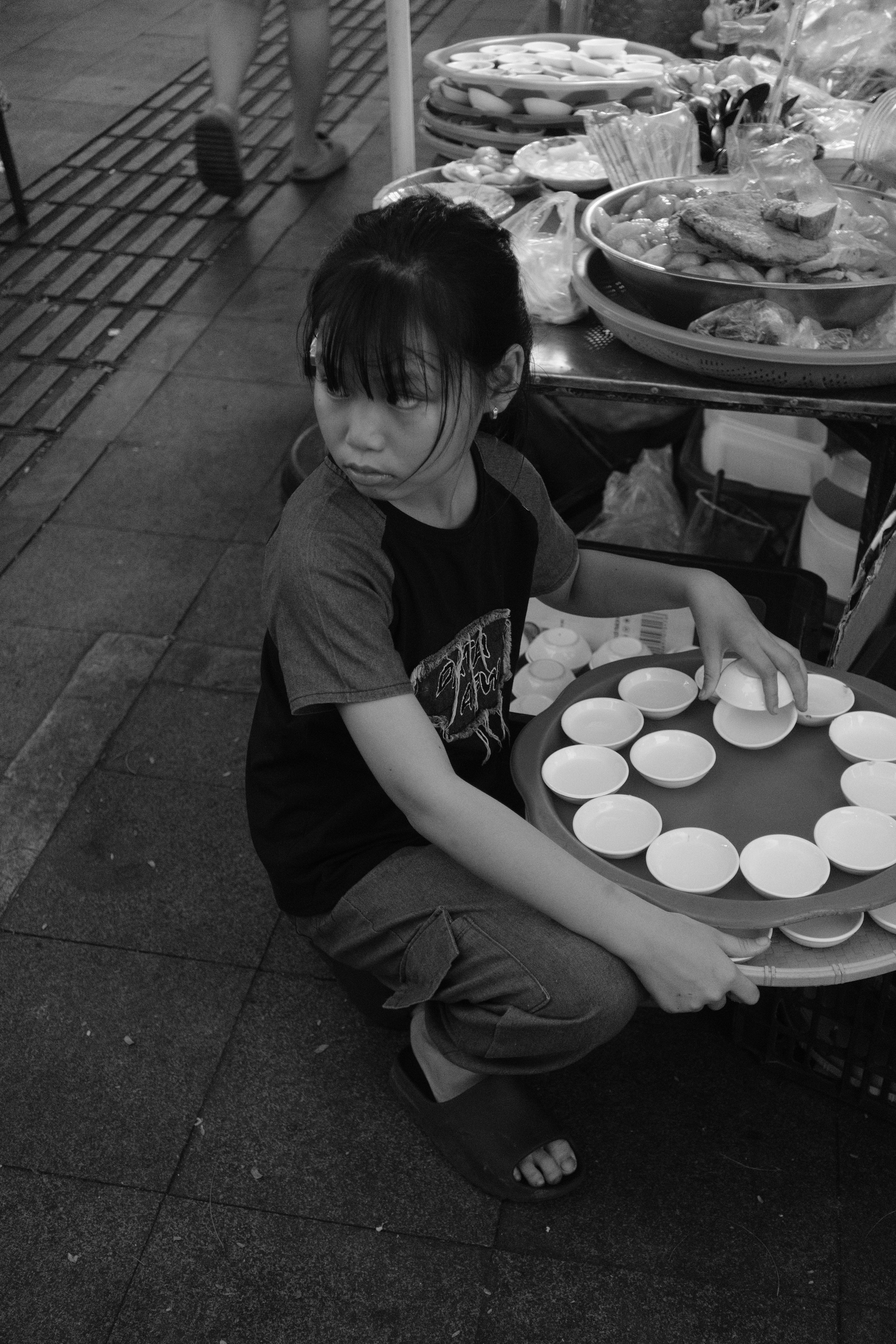 Rows of White Bowls, A Quiet Moment at the Street Stall