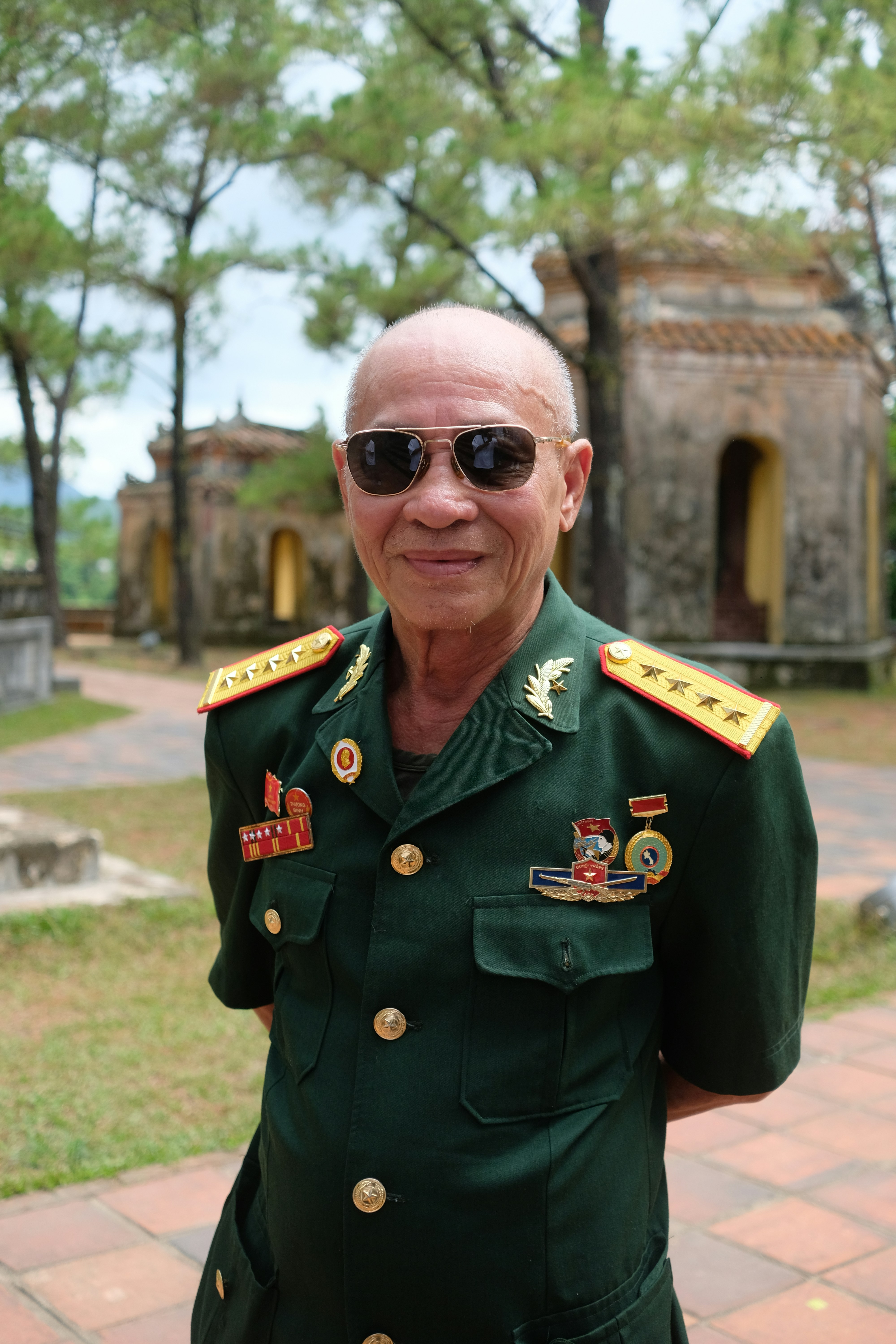 Medals and Moments: Portrait of a Veteran Amid Ancient Ruins