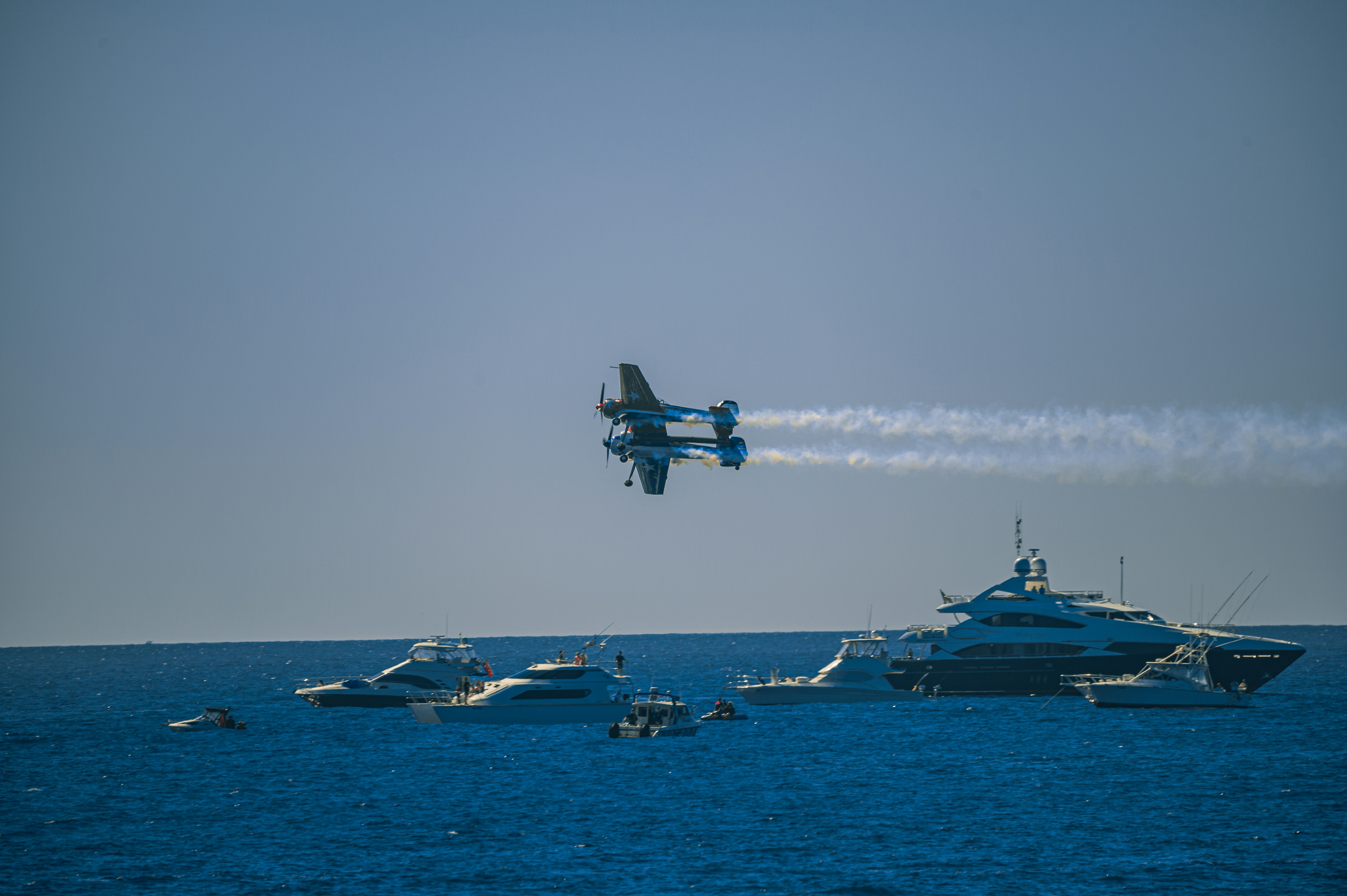Aerial Acrobatics Above the Azure Waves