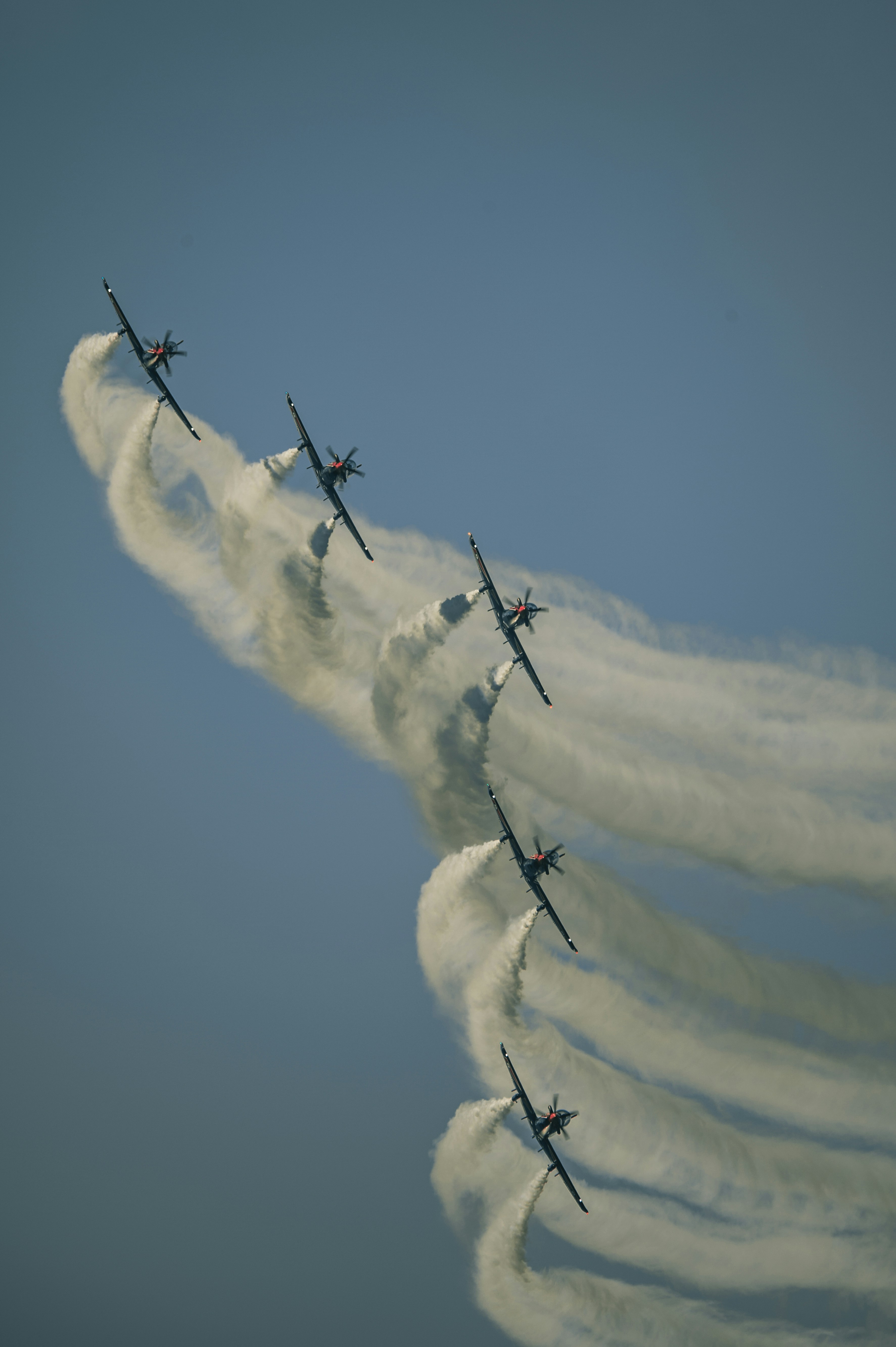 A group of planes flying in formation in the sky photo – Free Surfers ...