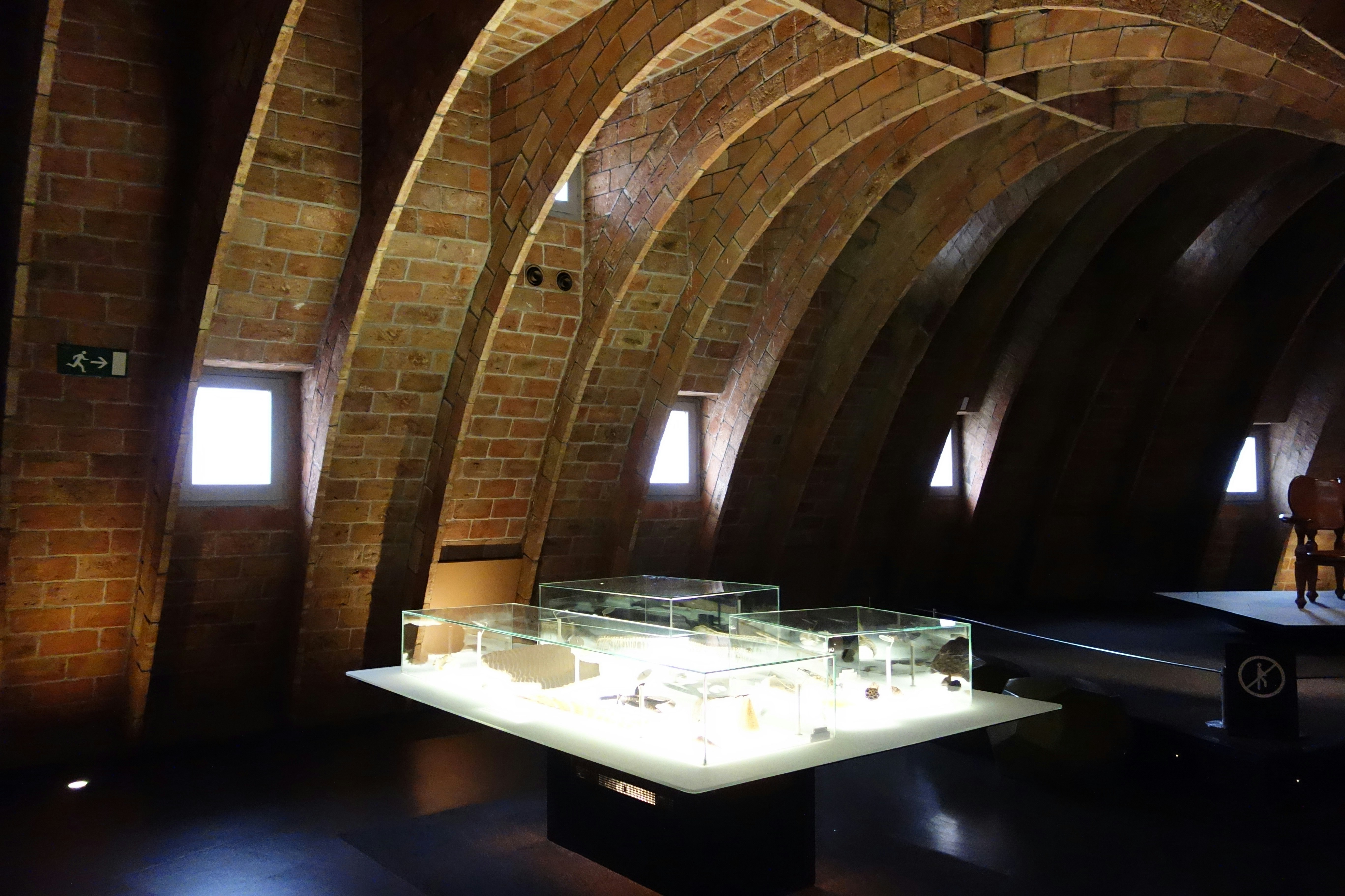 Illuminated Glass Case in a Brick-Arch Vault Gallery