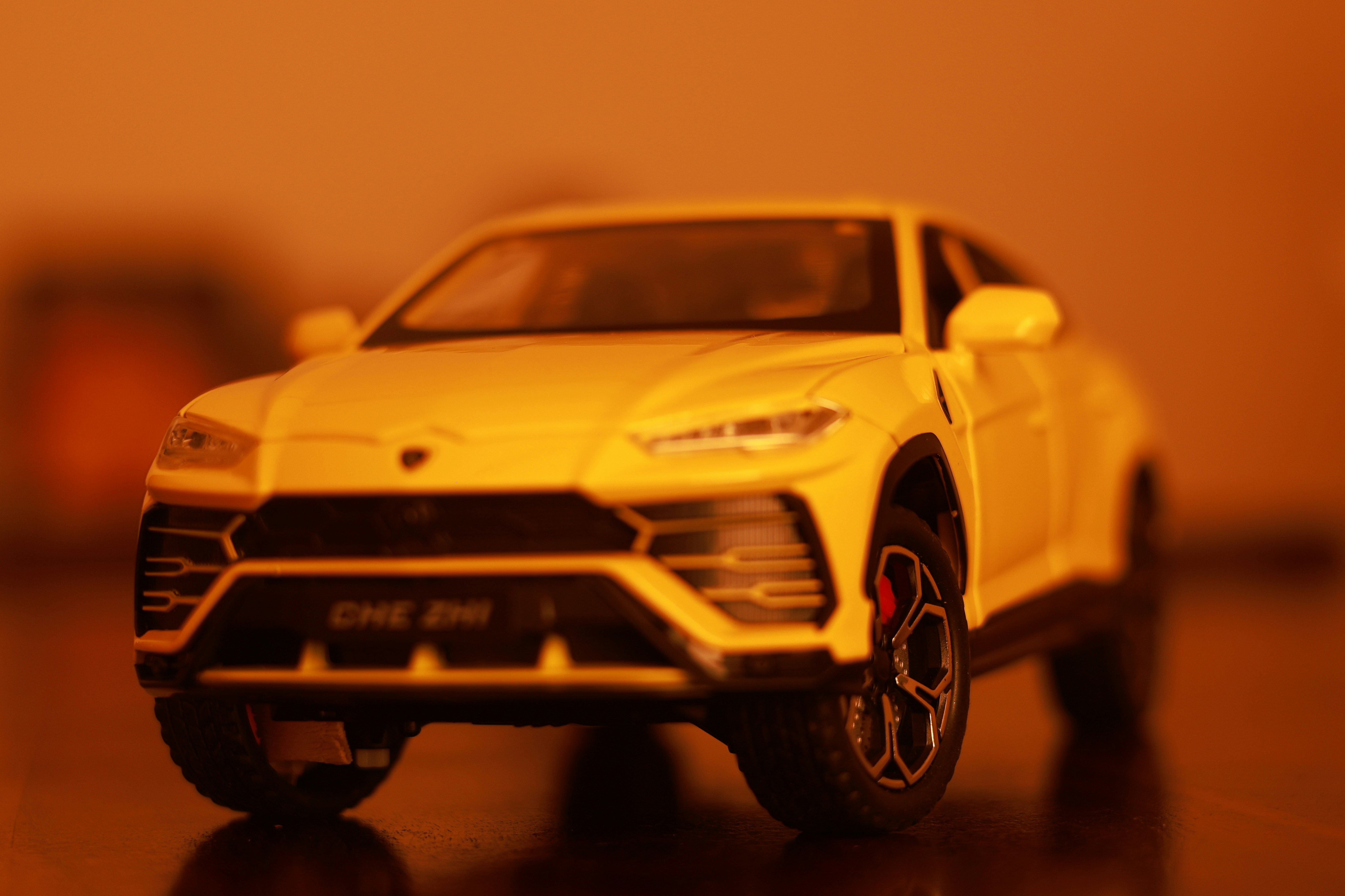 Golden Glow on Miniature Luxury SUV