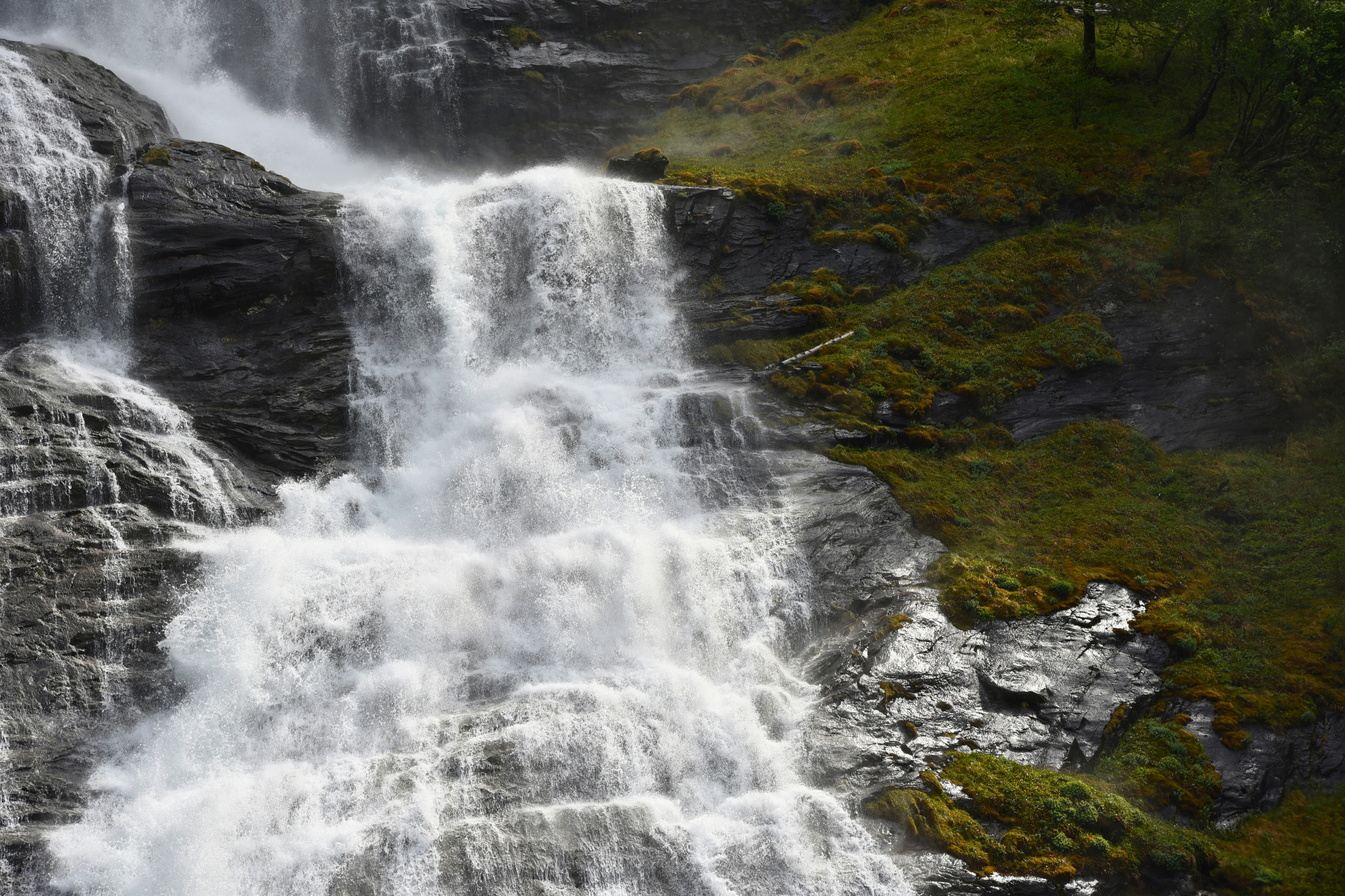 A large waterfall with lots of water coming out of it photo – Free ...
