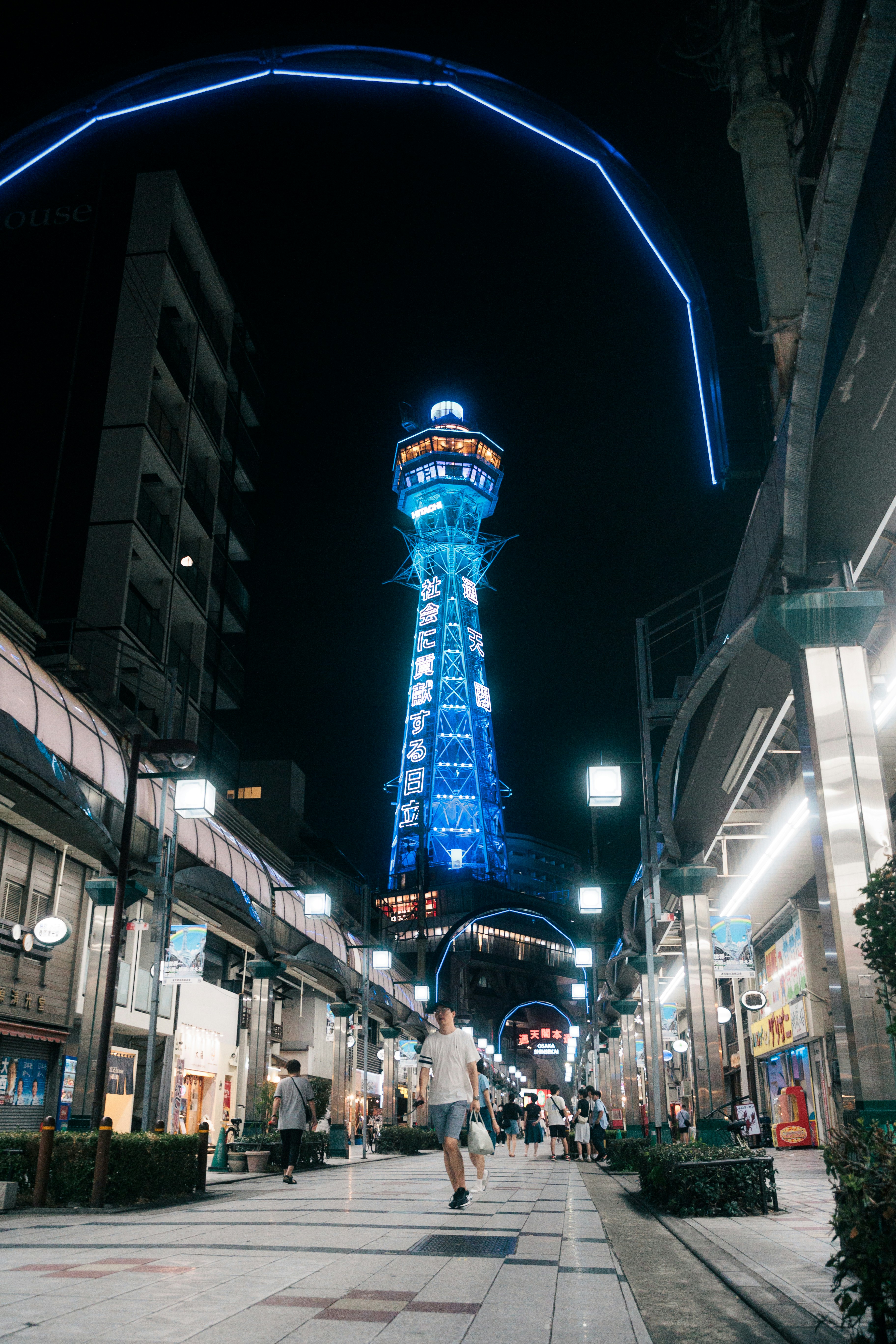 Blue Neon Sentinel: Tsutenkaku Rises Over Osaka's Lanterned Arcade