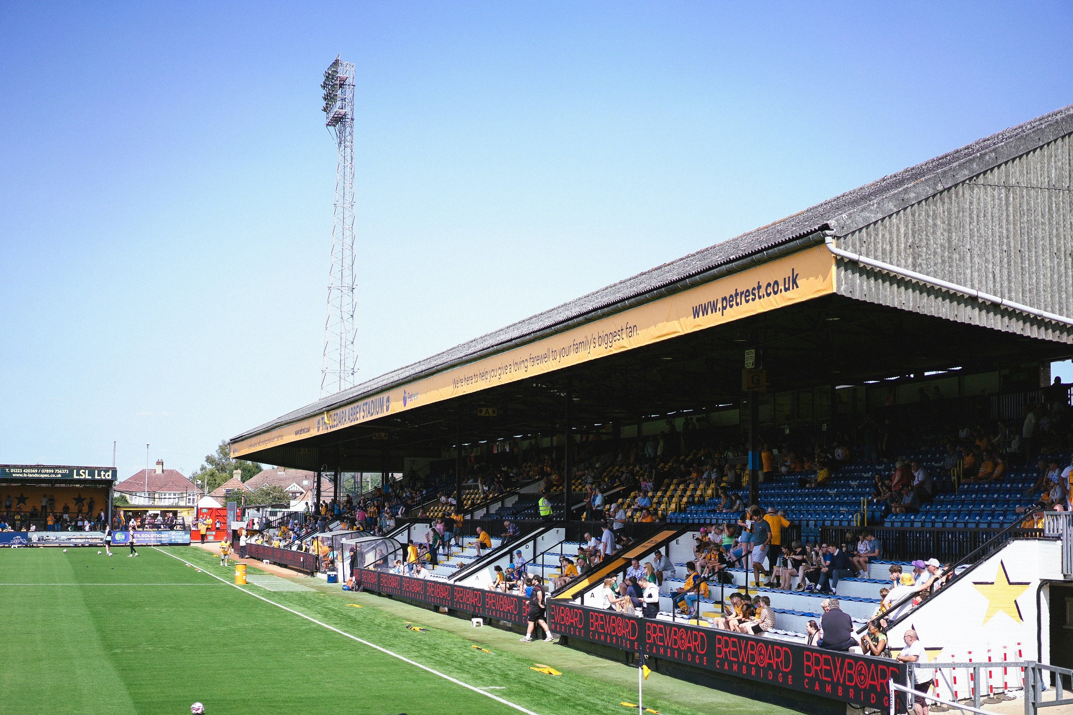 A soccer field with a large crowd of people photo – Free Team Image on ...