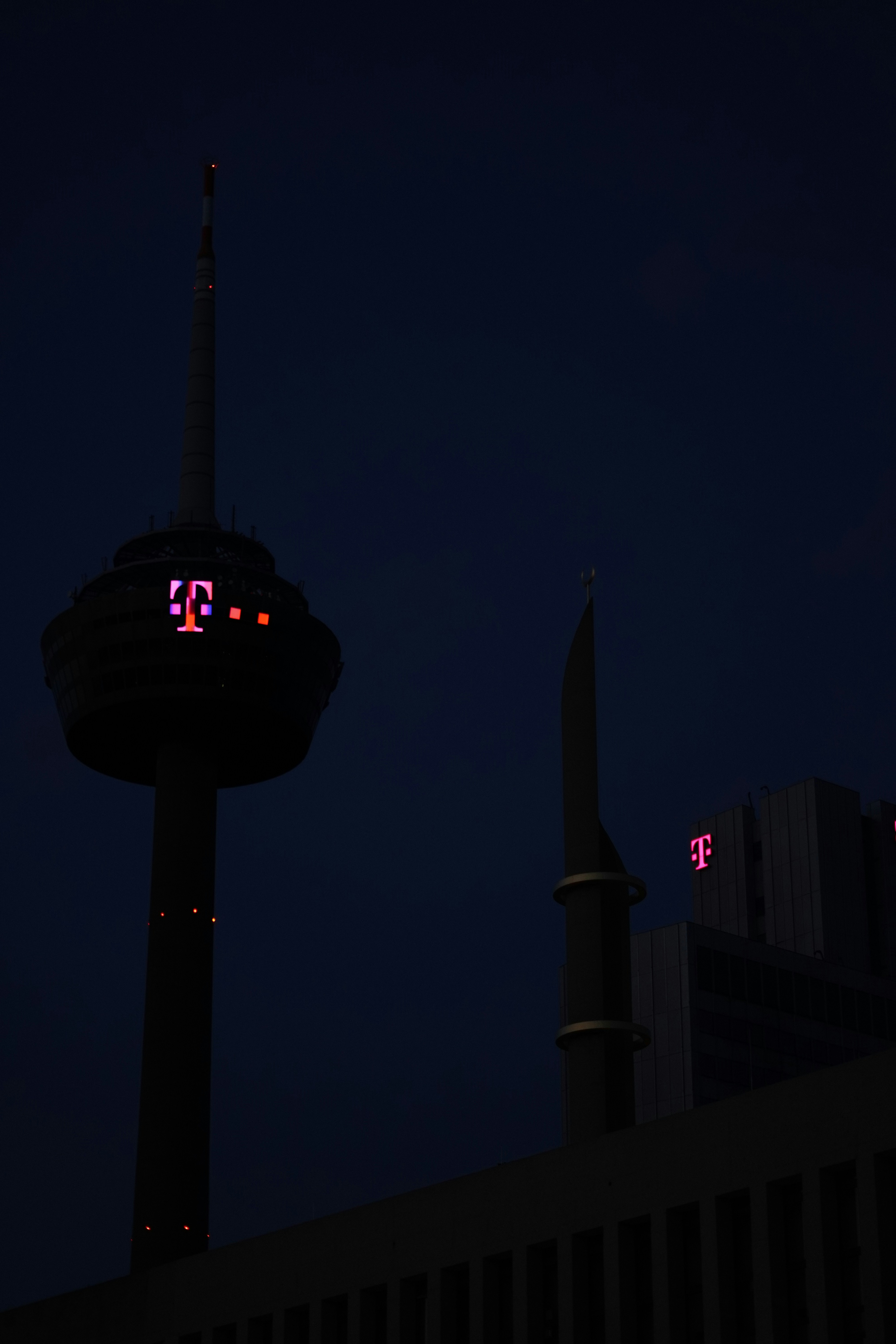 A tall tower with a clock on it's side photo – Free Cologne Image on ...