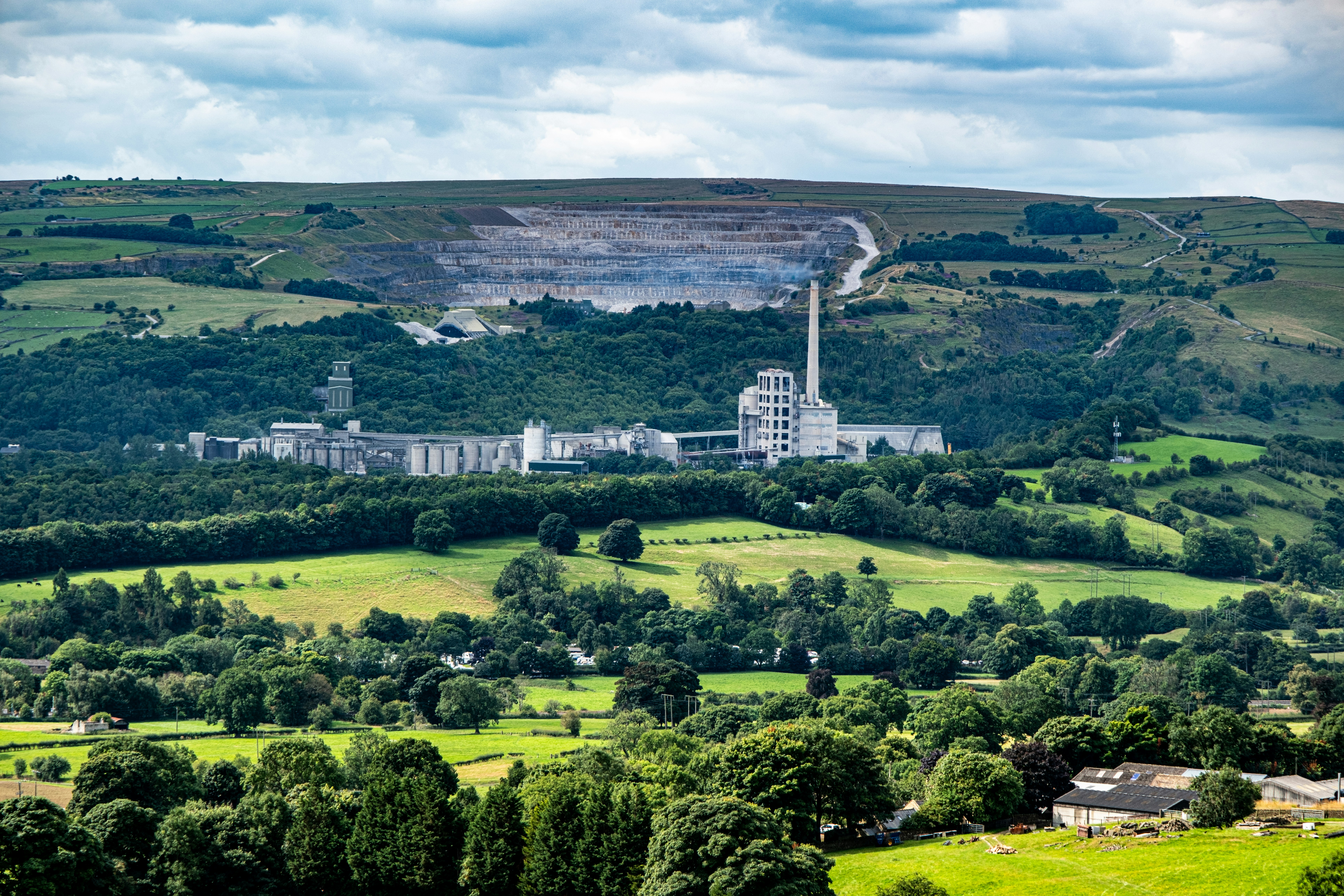 A view of a large factory in the distance photo – Free Plant Image on ...