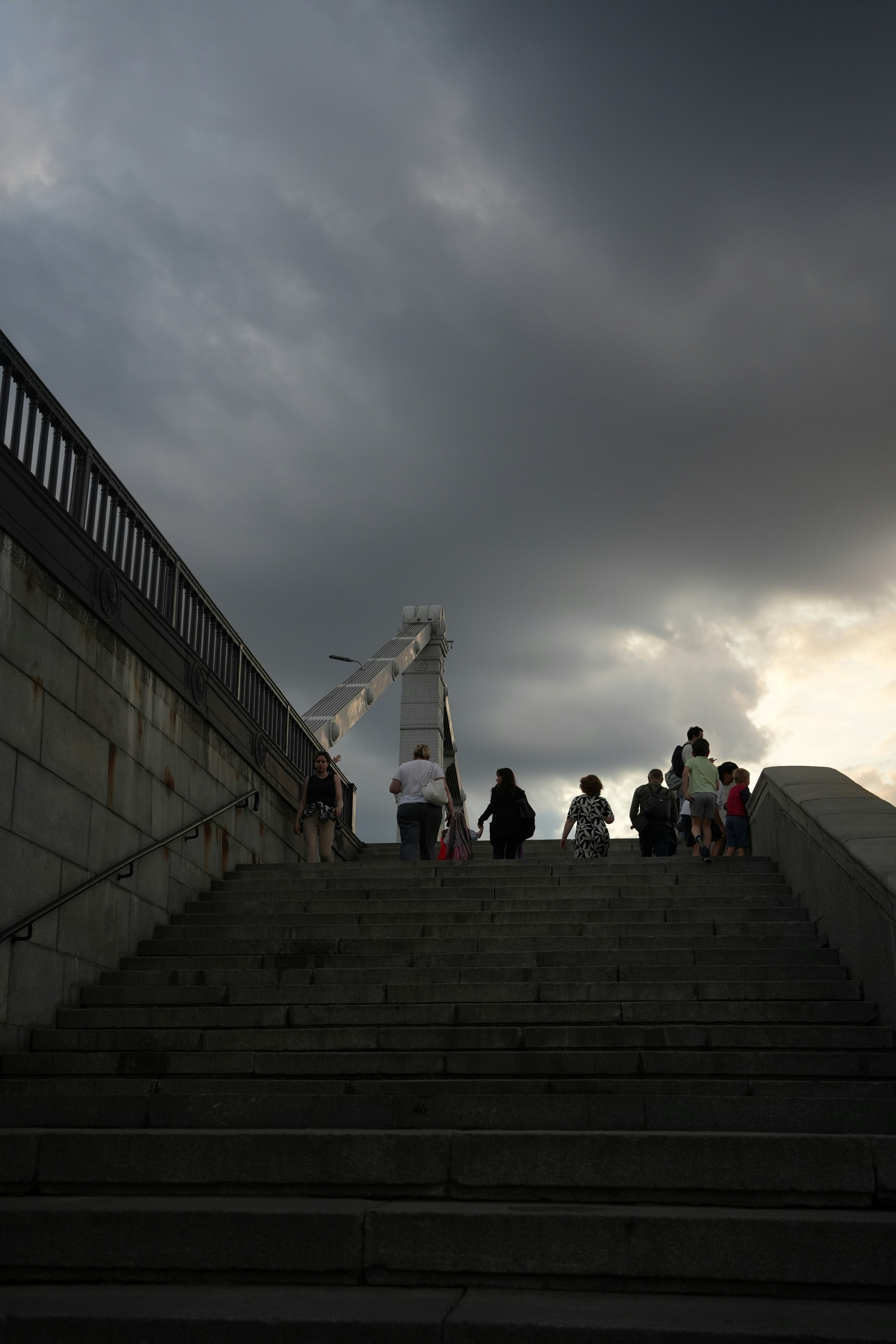 A group of people walking up a flight of stairs photo – Free House ...