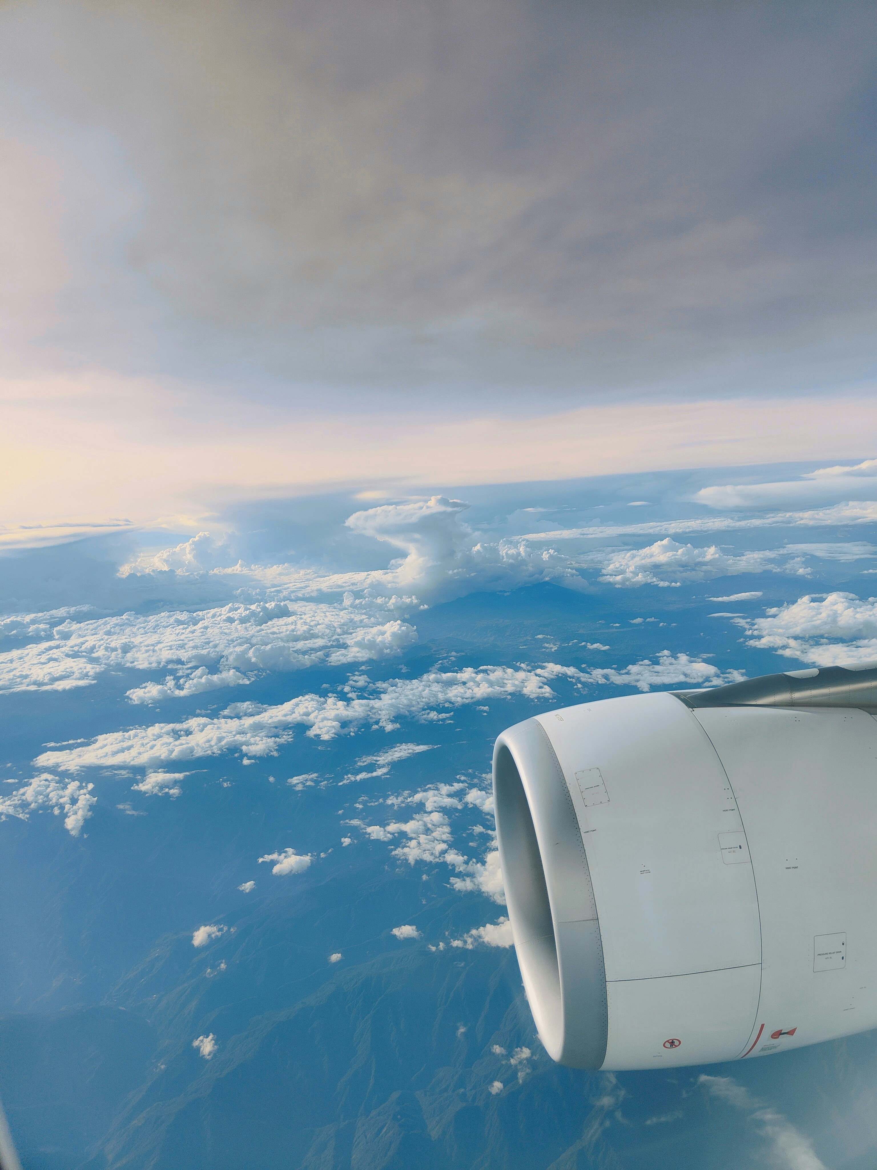 A view of the wing of an airplane from above photo – Free Sky Image on ...