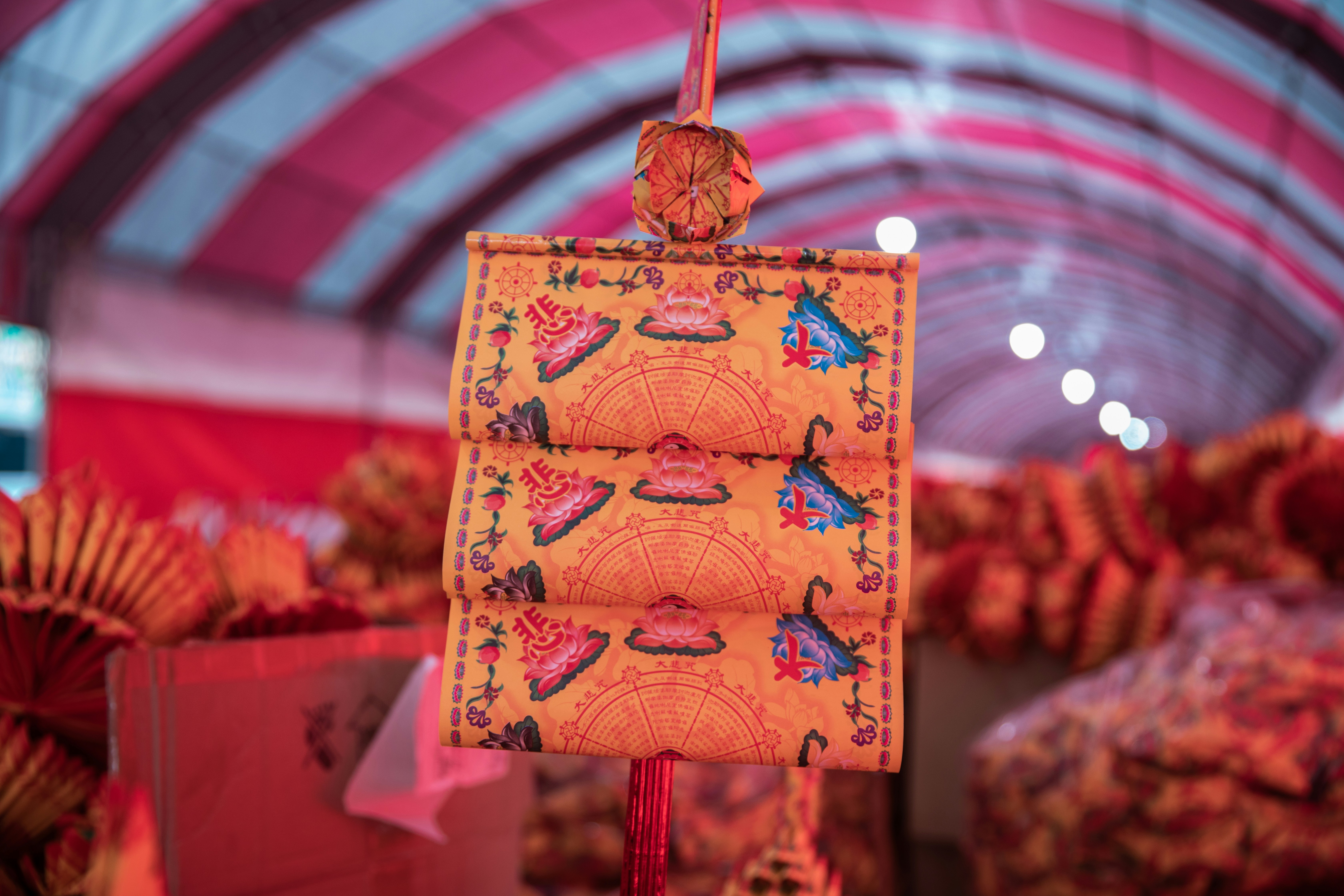 Floating Lanterns and Lunar Decor at a Red Market Stall