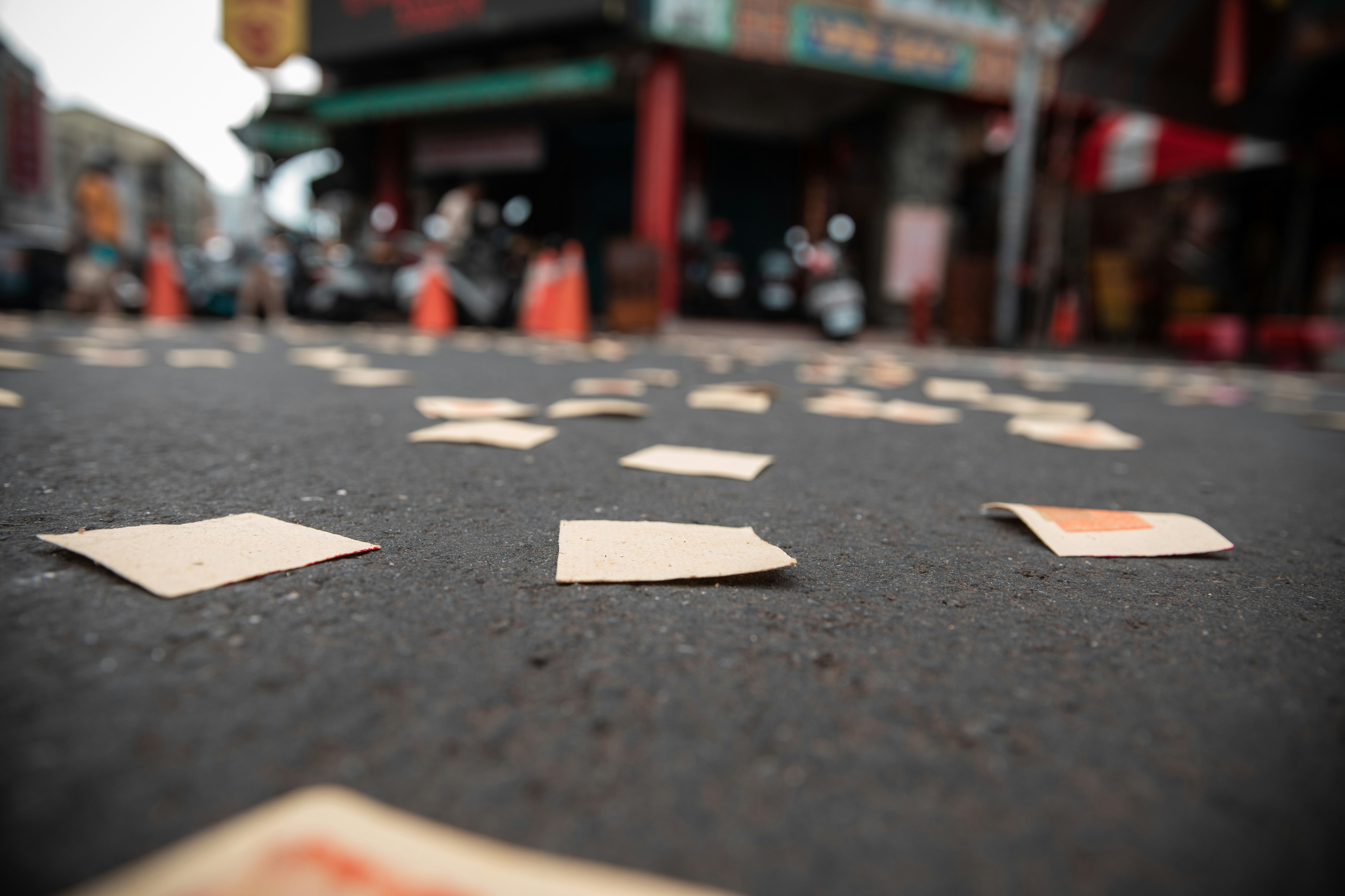 A street that has been blocked off with pieces of paper photo – Free ...